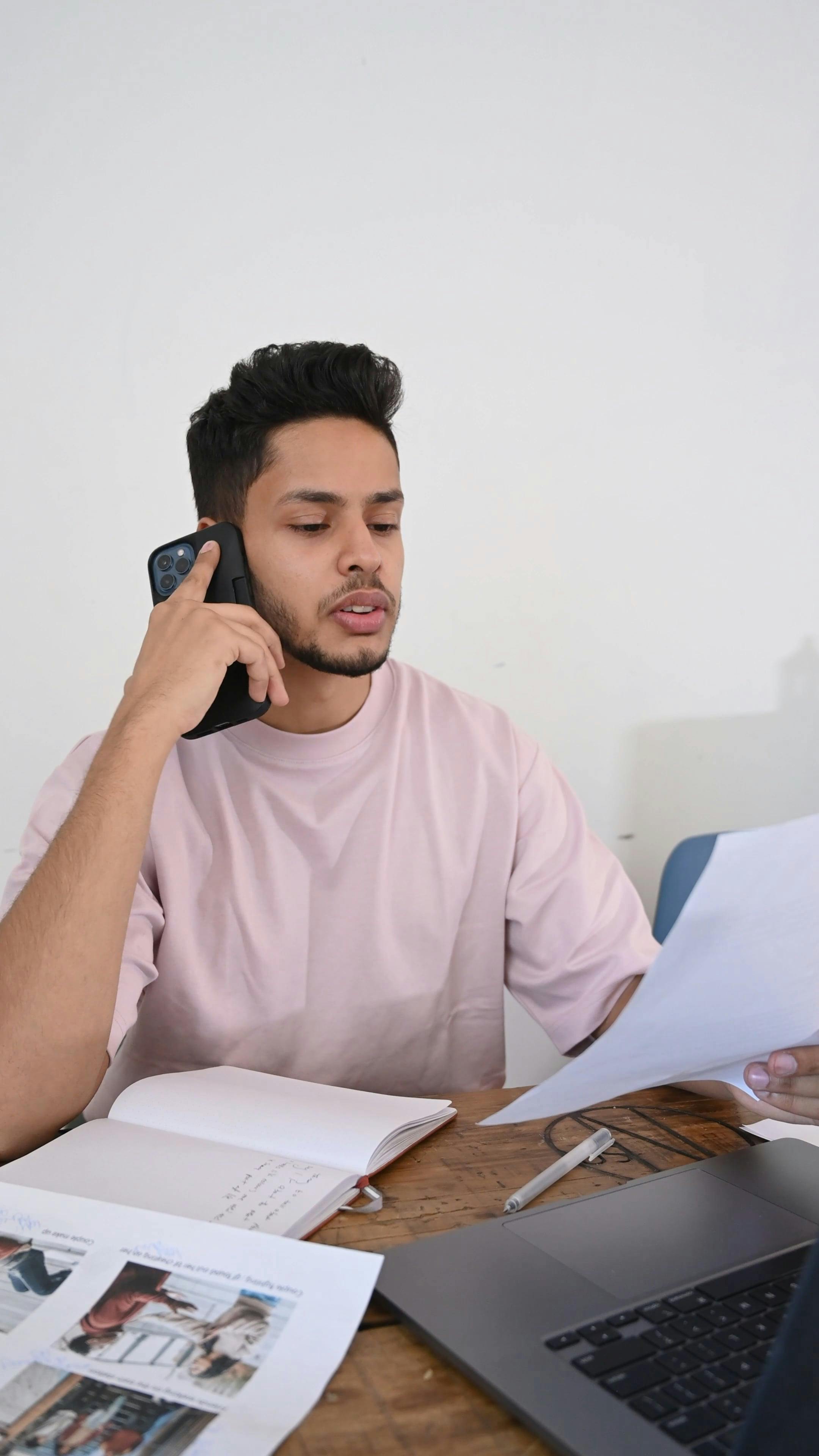 Man Talking on the Phone while Discussing a Lesson Free Stock Video ...