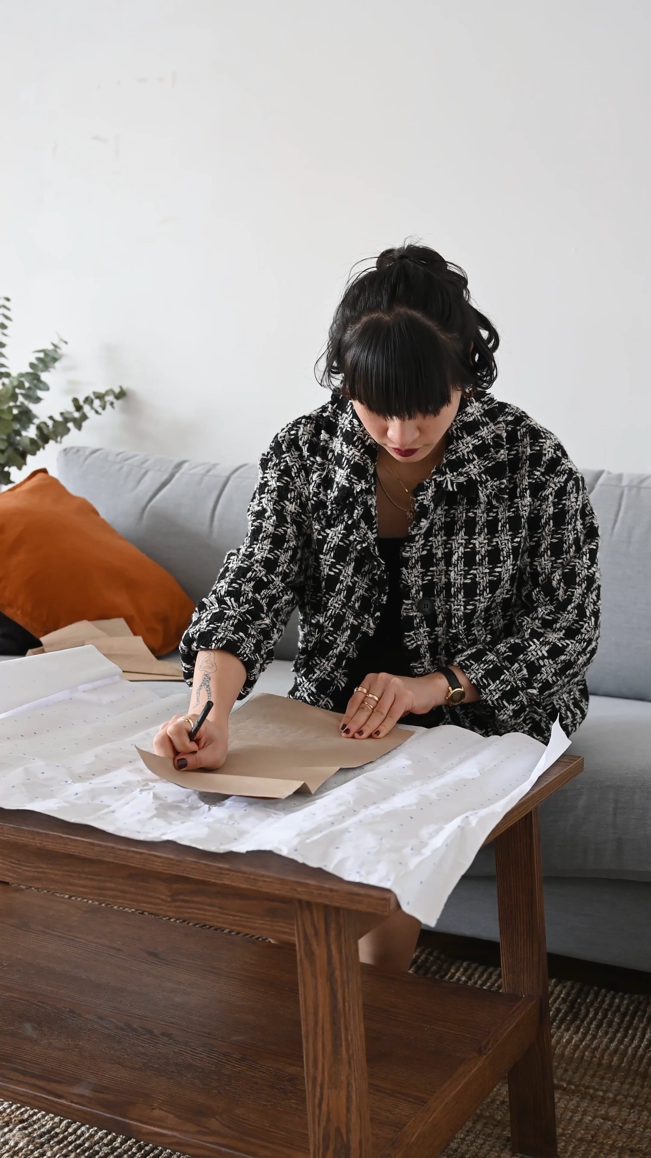 Woman Using Stencil to Trace Pattern · Free Stock Video