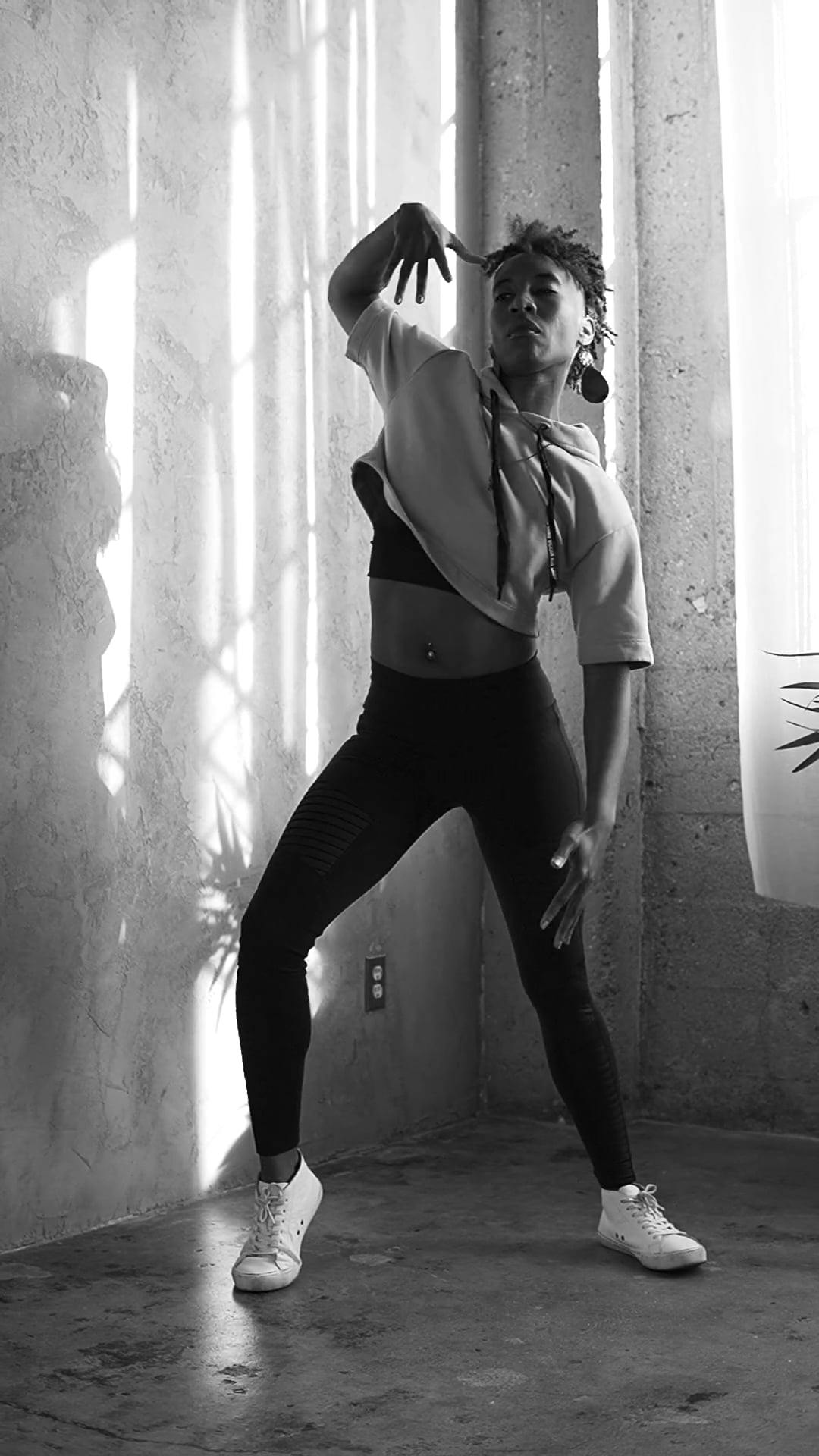 A Woman Dancing While Looking at the Camera · Free Stock Video