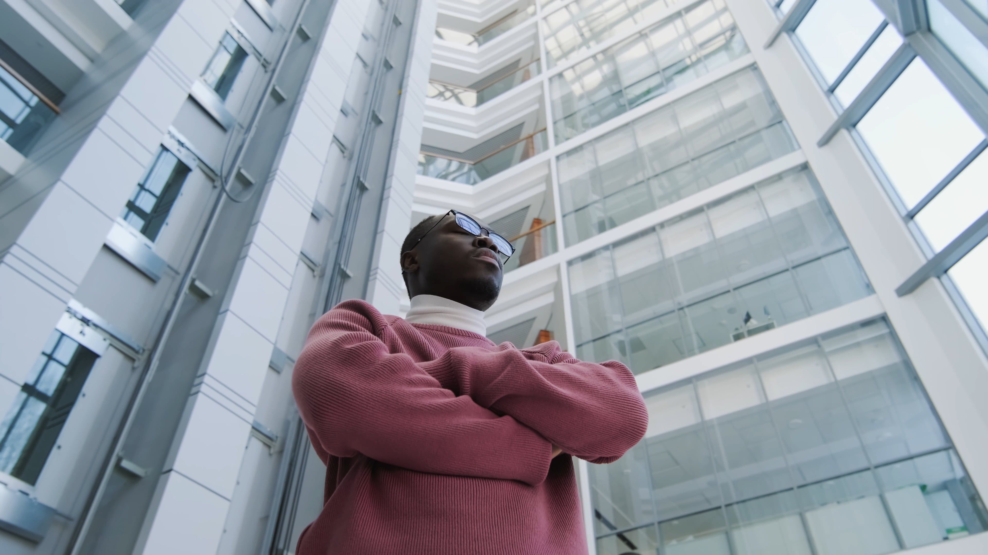 Man Looking Around While Waiting Outside The Building Free Stock Video ...