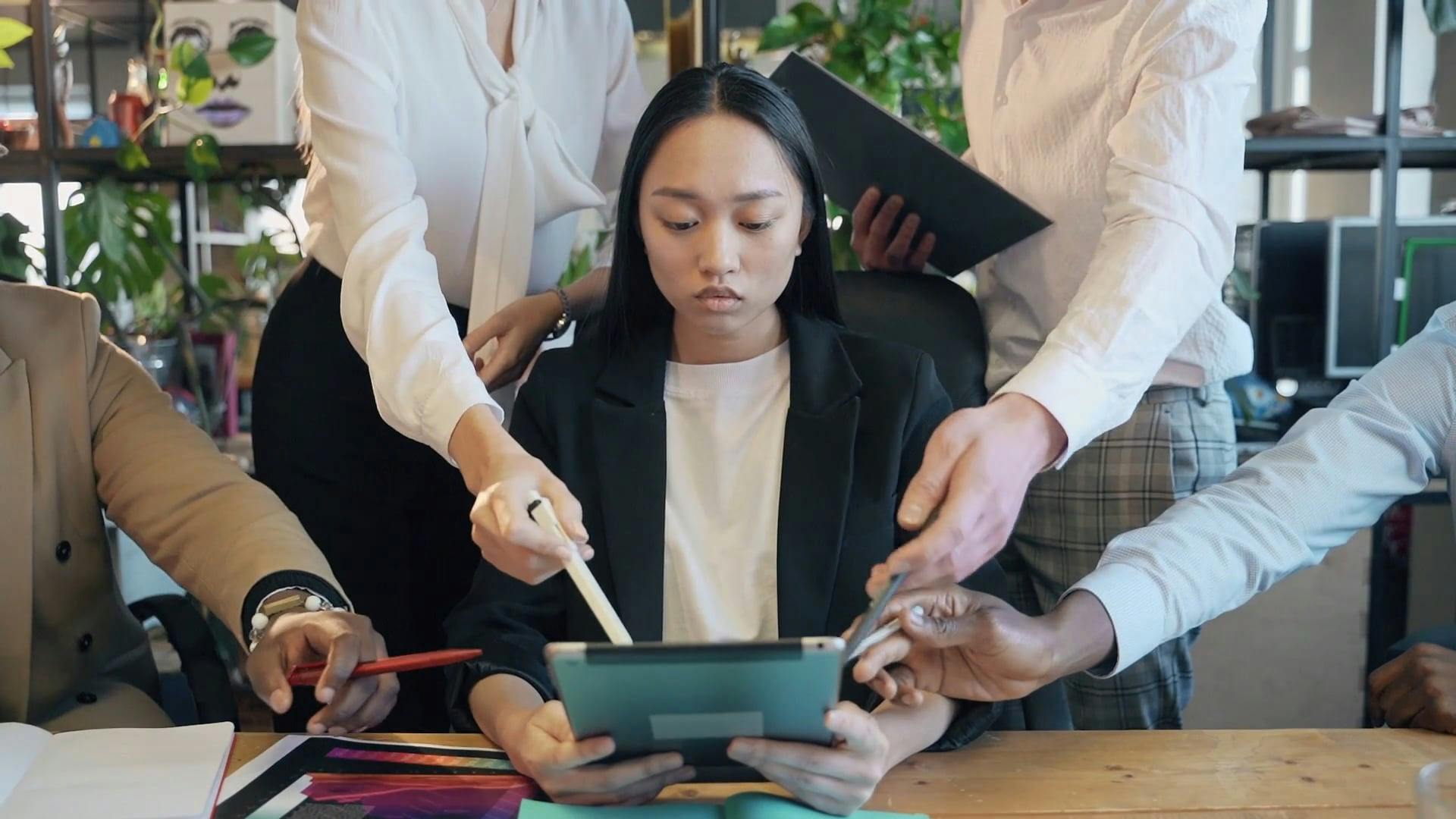 Confused Woman Sitting while Holding a Tablet · Free Stock Video