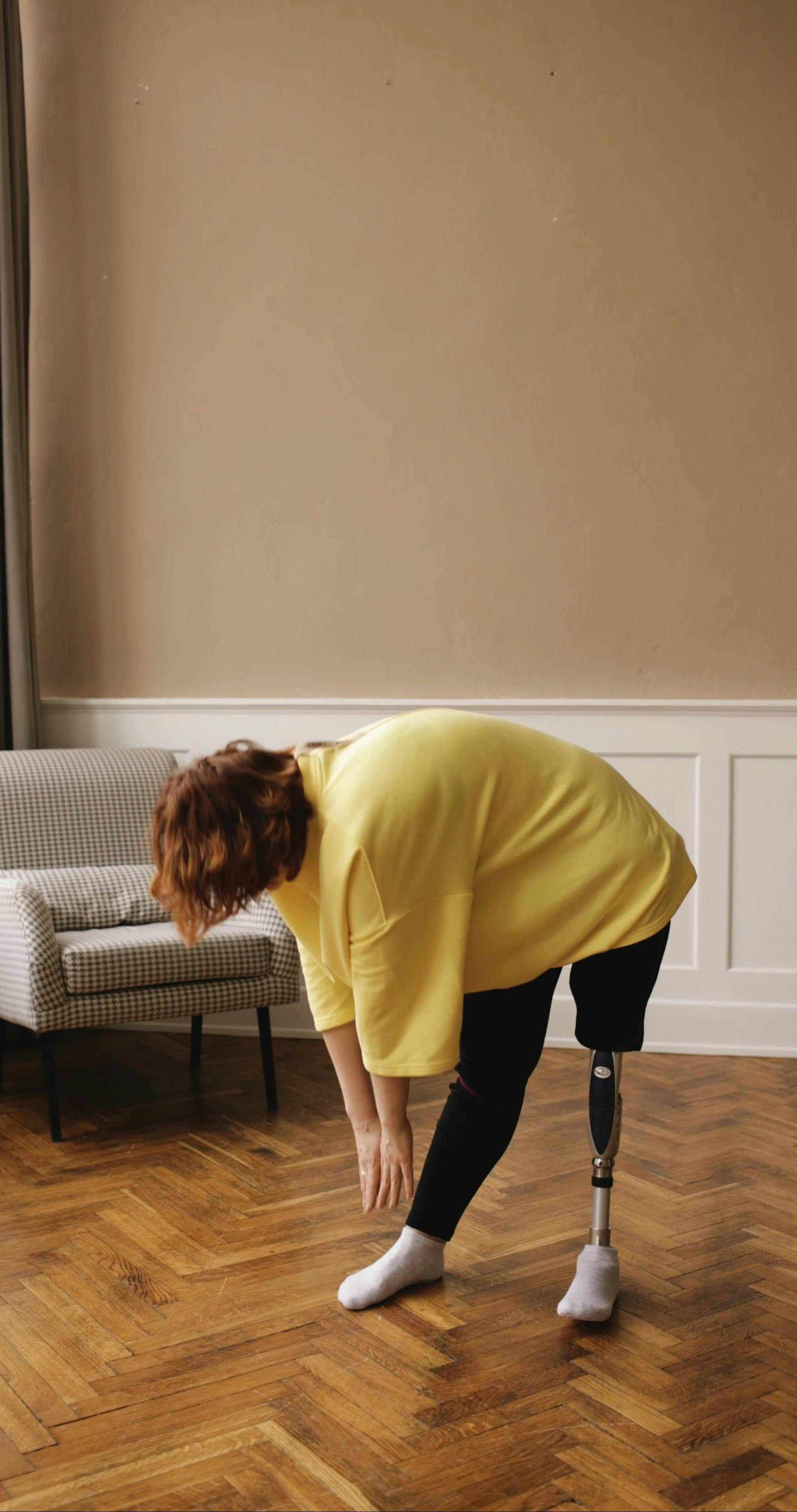 A Woman With Prosthetic Leg is Exercising · Free Stock Video