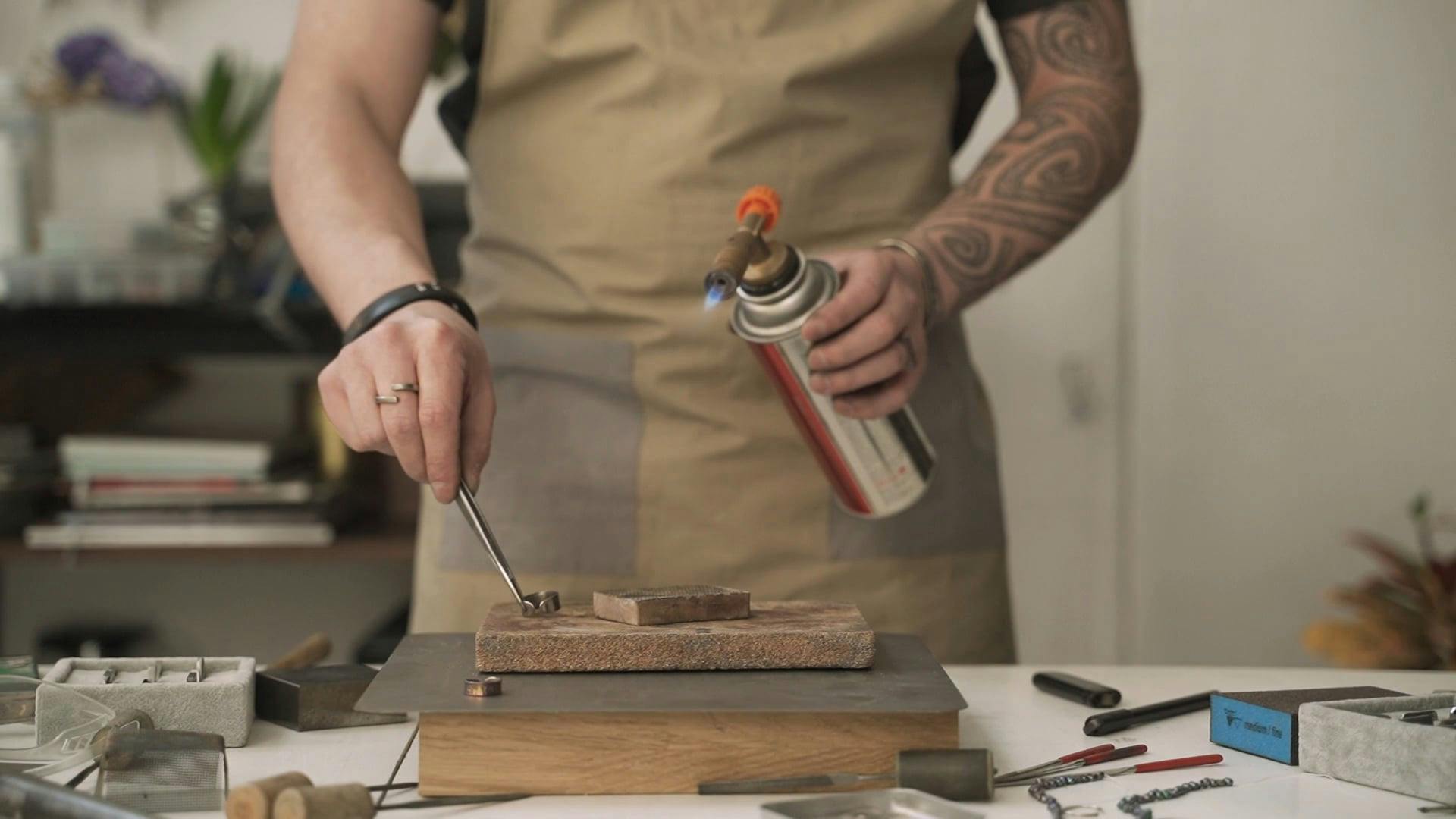 A Man Blow Torching the Ring · Free Stock Video