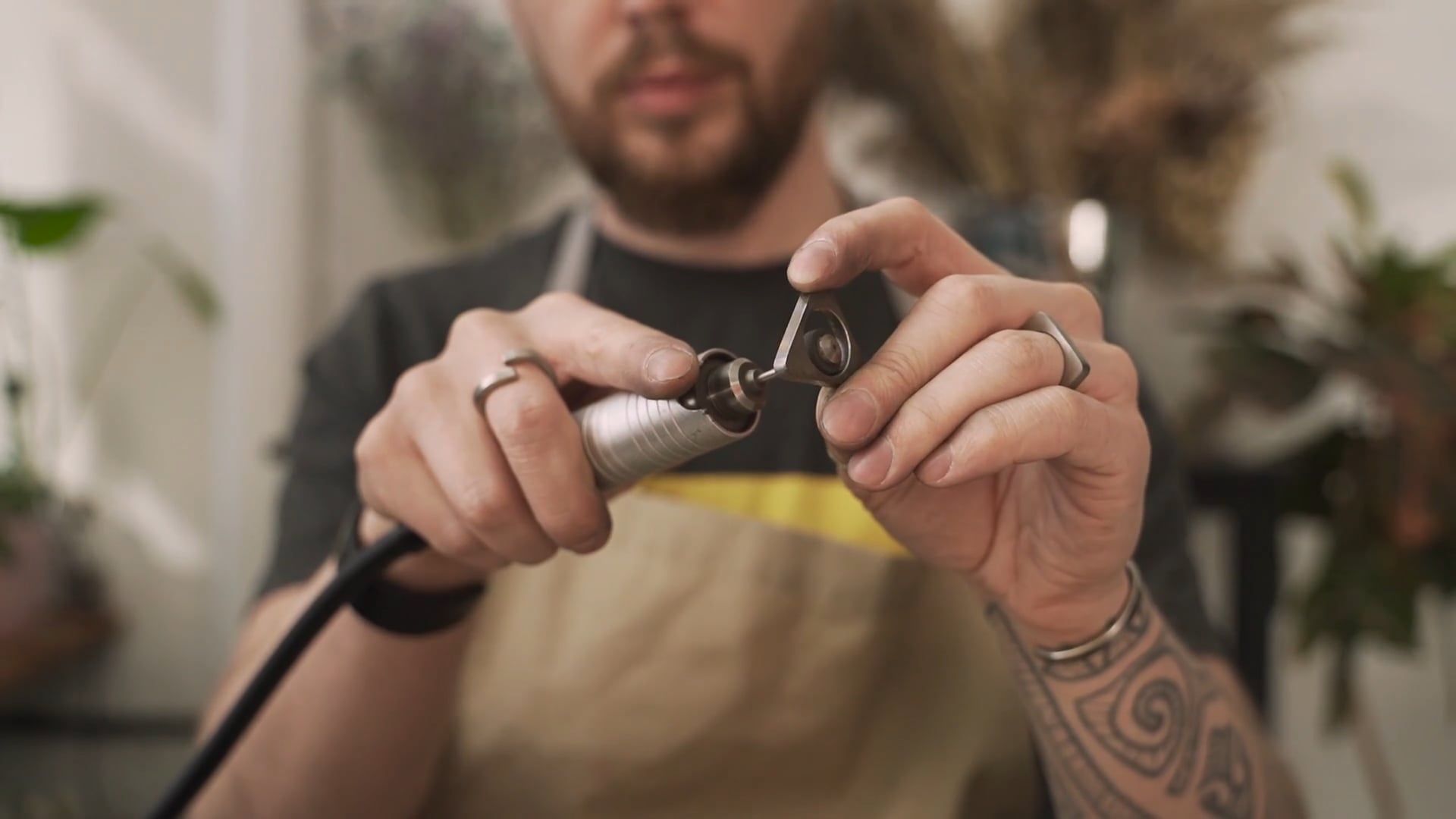 Bearded Man Polishing The Metal Using His Grinder · Free Stock Video