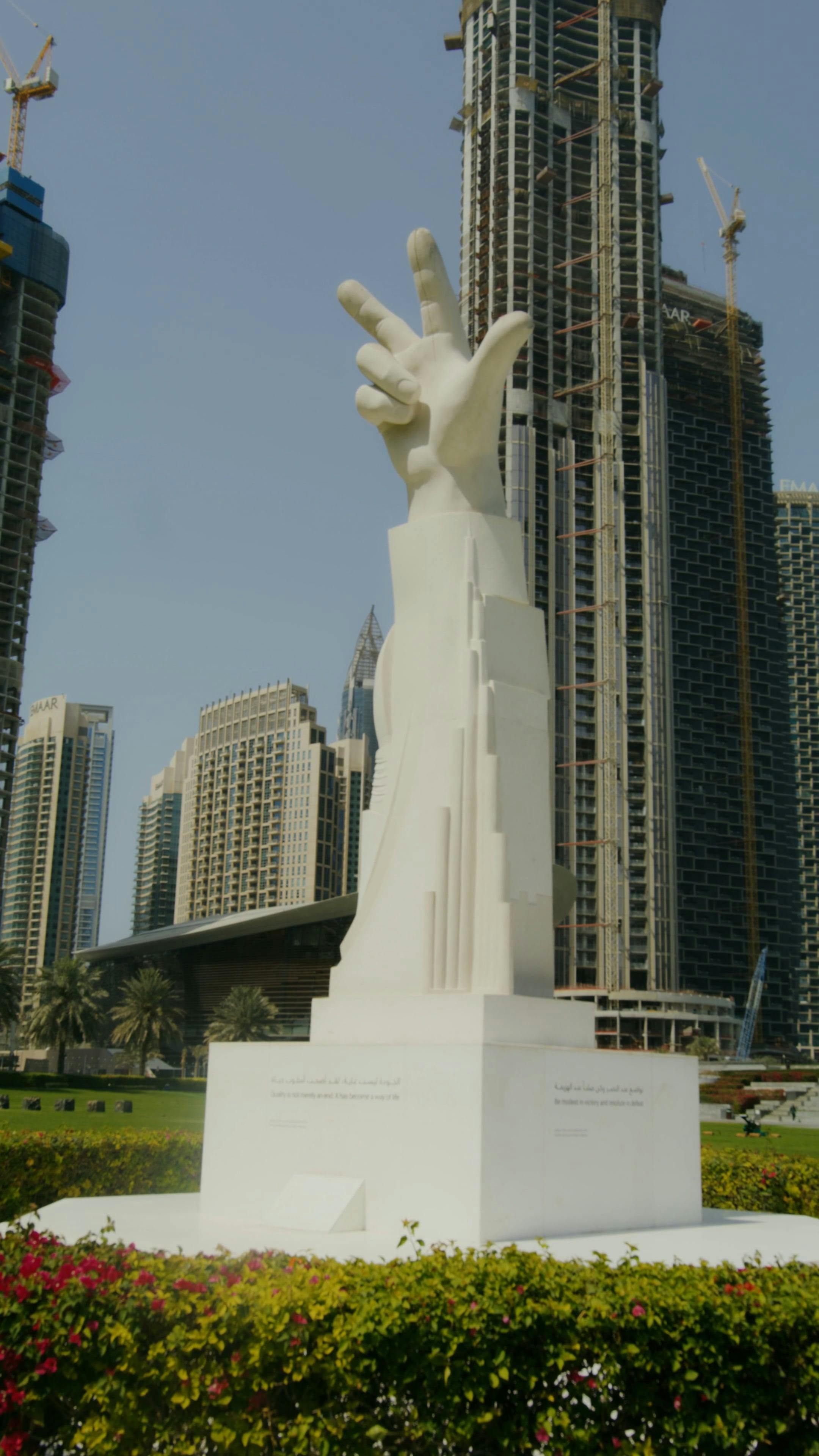 A Hand Statue in Front of Modern Buildings · Free Stock Video