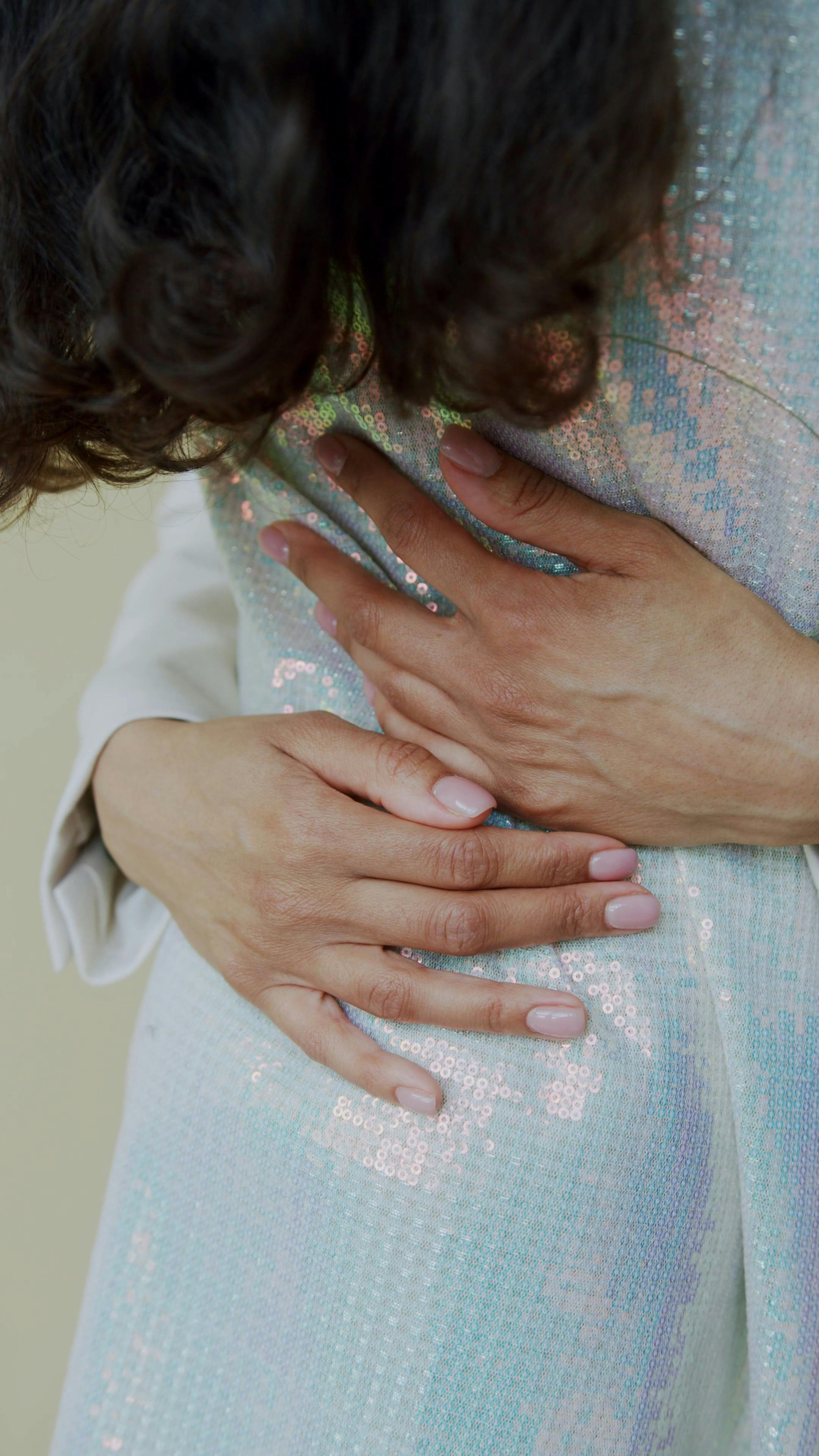 Close-up Footage of a Hands on a Person's Back · Free Stock Video