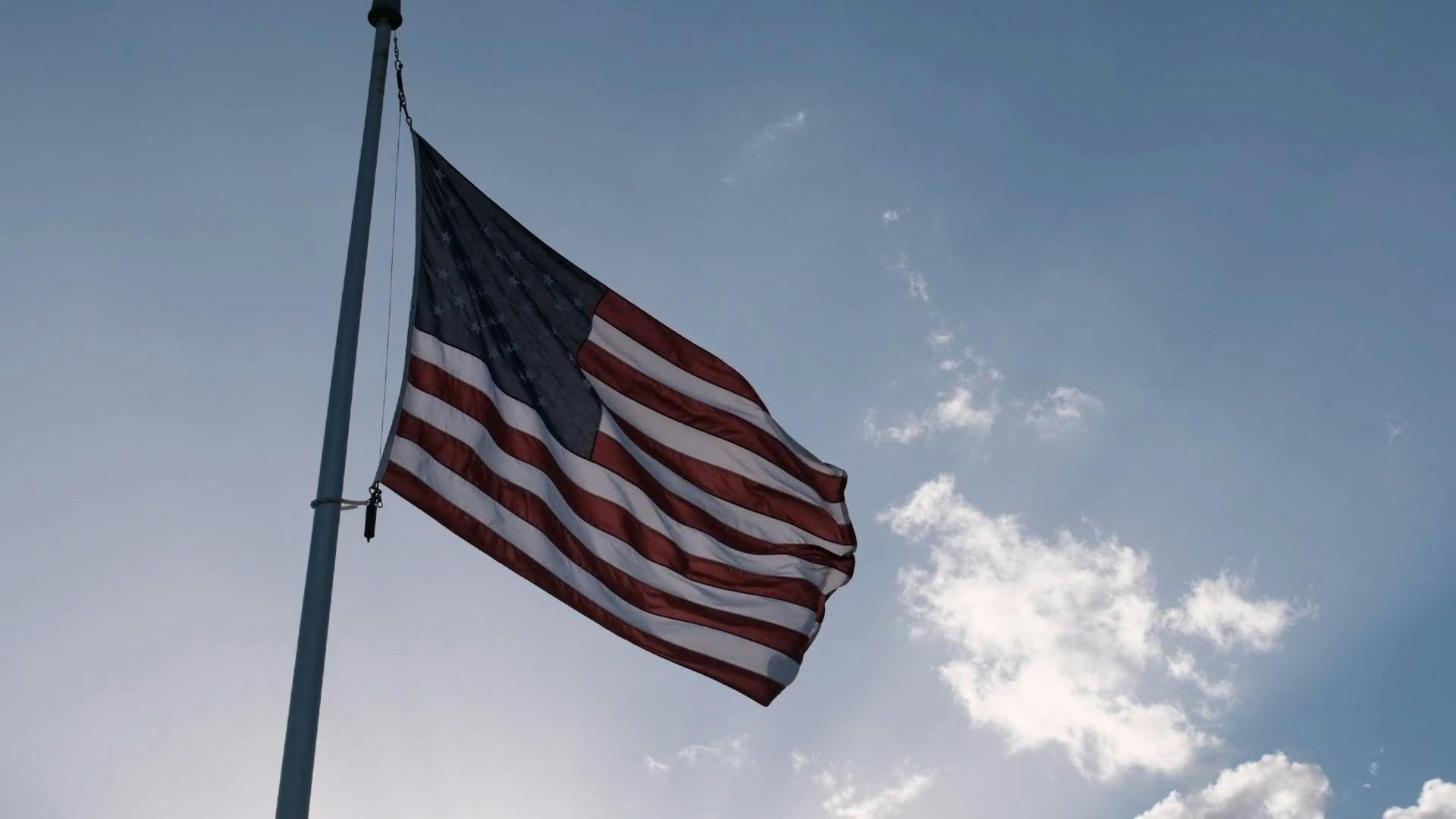 American Flag Raised on a Flagpole · Free Stock Video