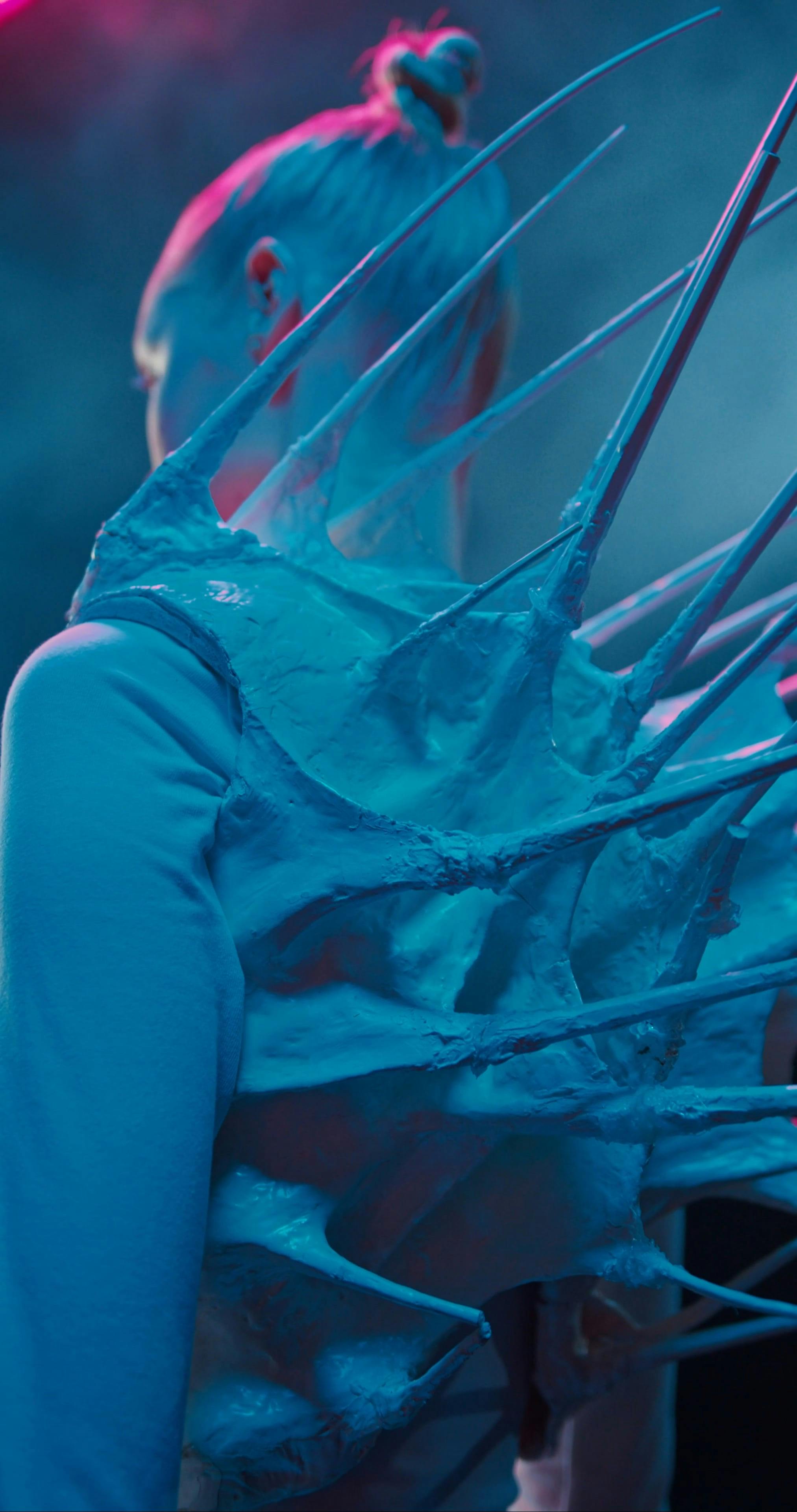 A Woman Wearing A Costume With Back Spikes Free Stock Video Footage ...