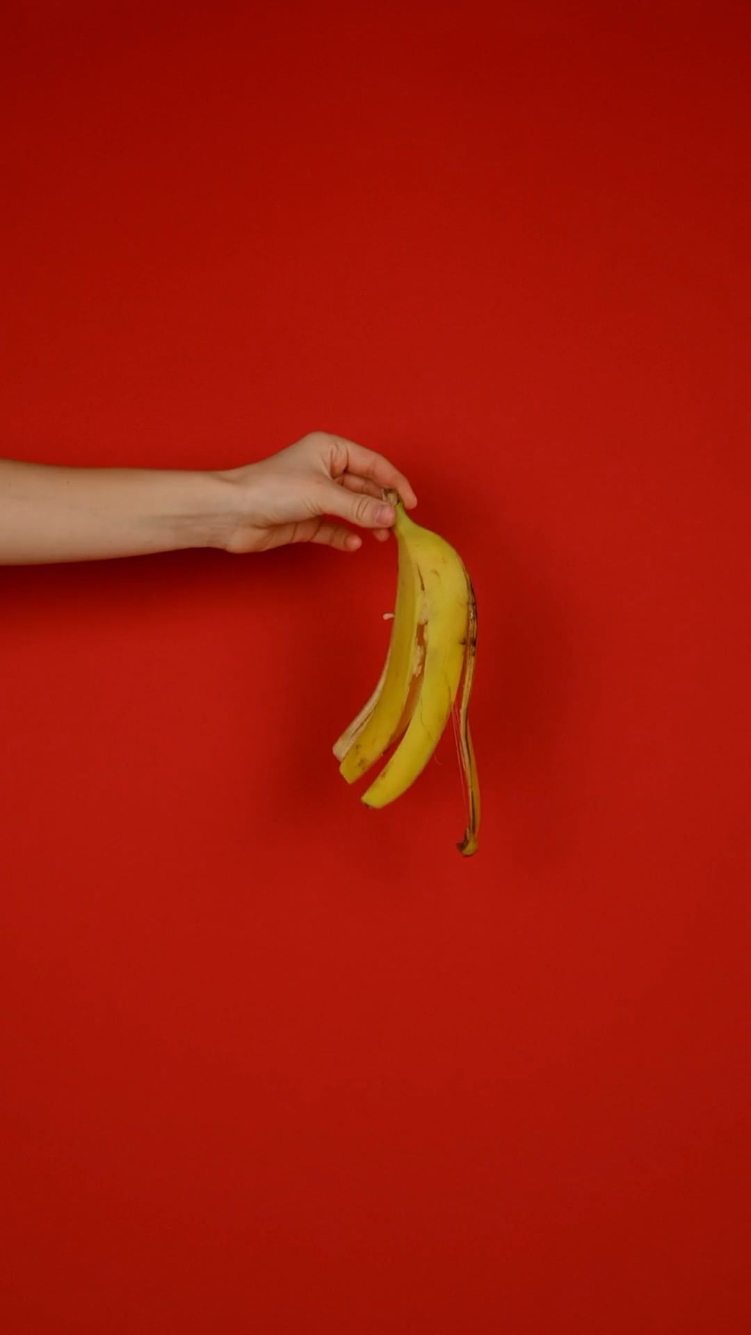 Person Dropping a Banana Peel · Free Stock Video