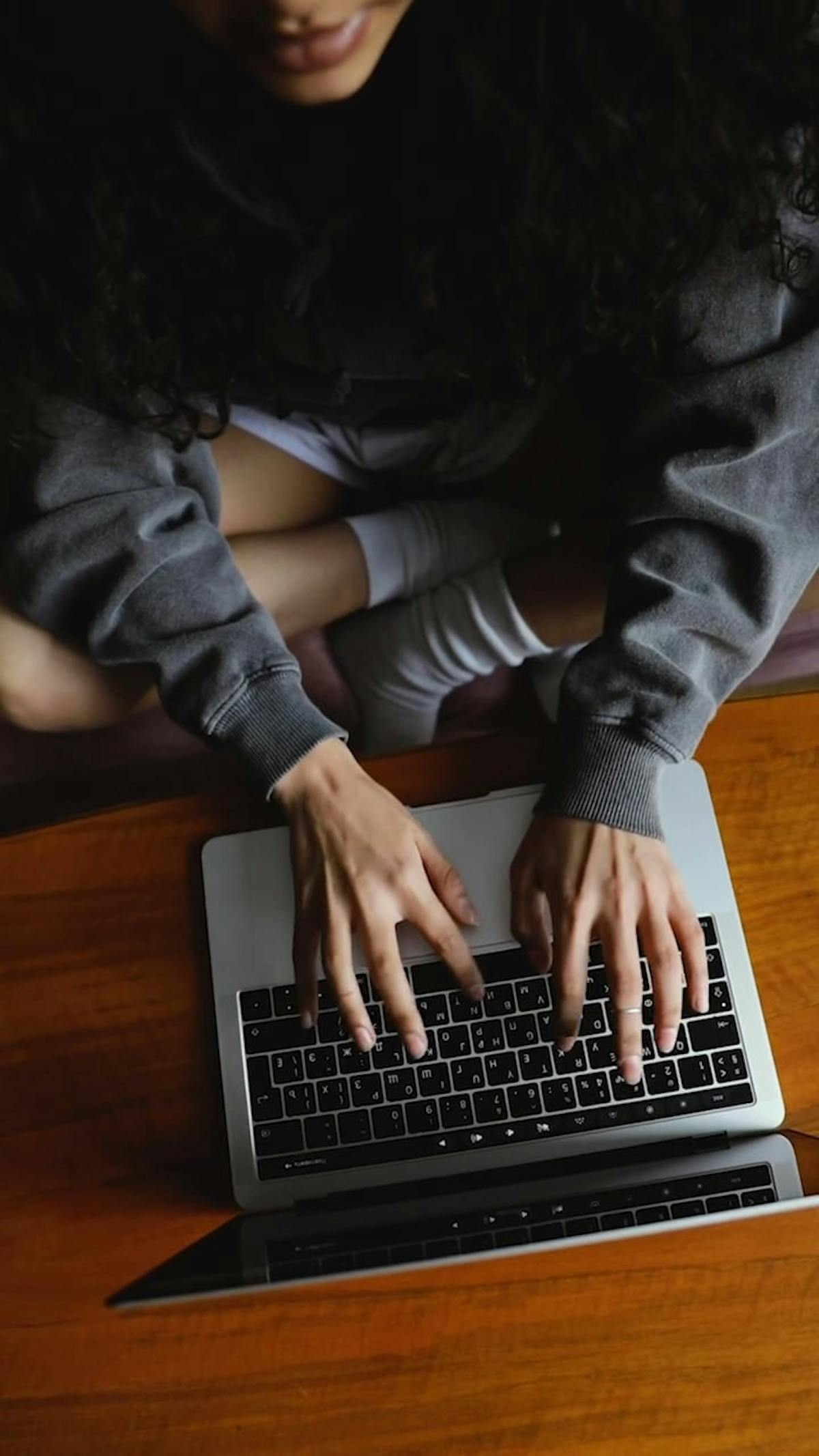 Person Sitting At Their Desk, Staring Blankly At Their Computer Screen ...