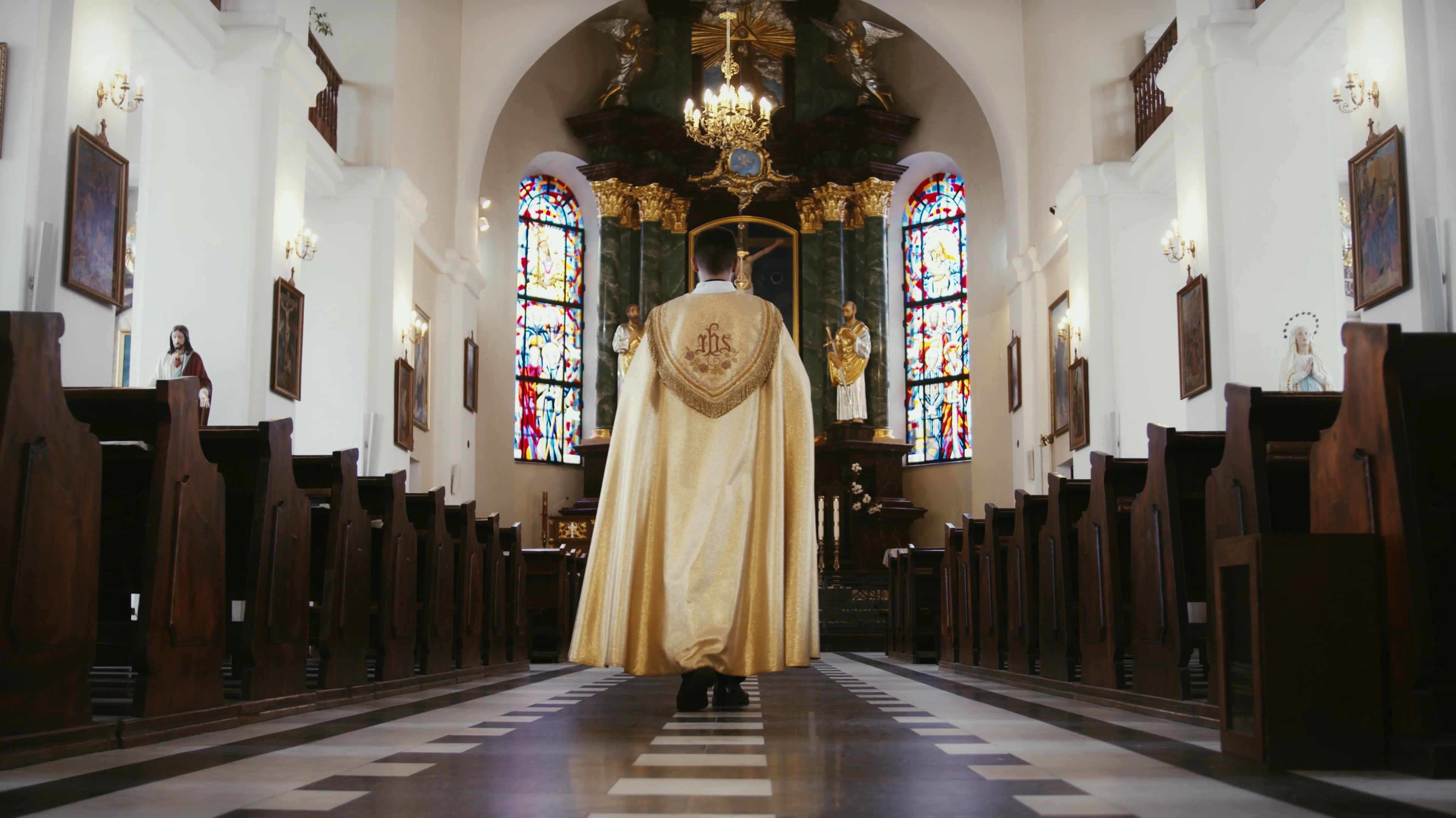 A Priest Walking Down an Aisle Free Stock Video Footage, Royalty-Free ...
