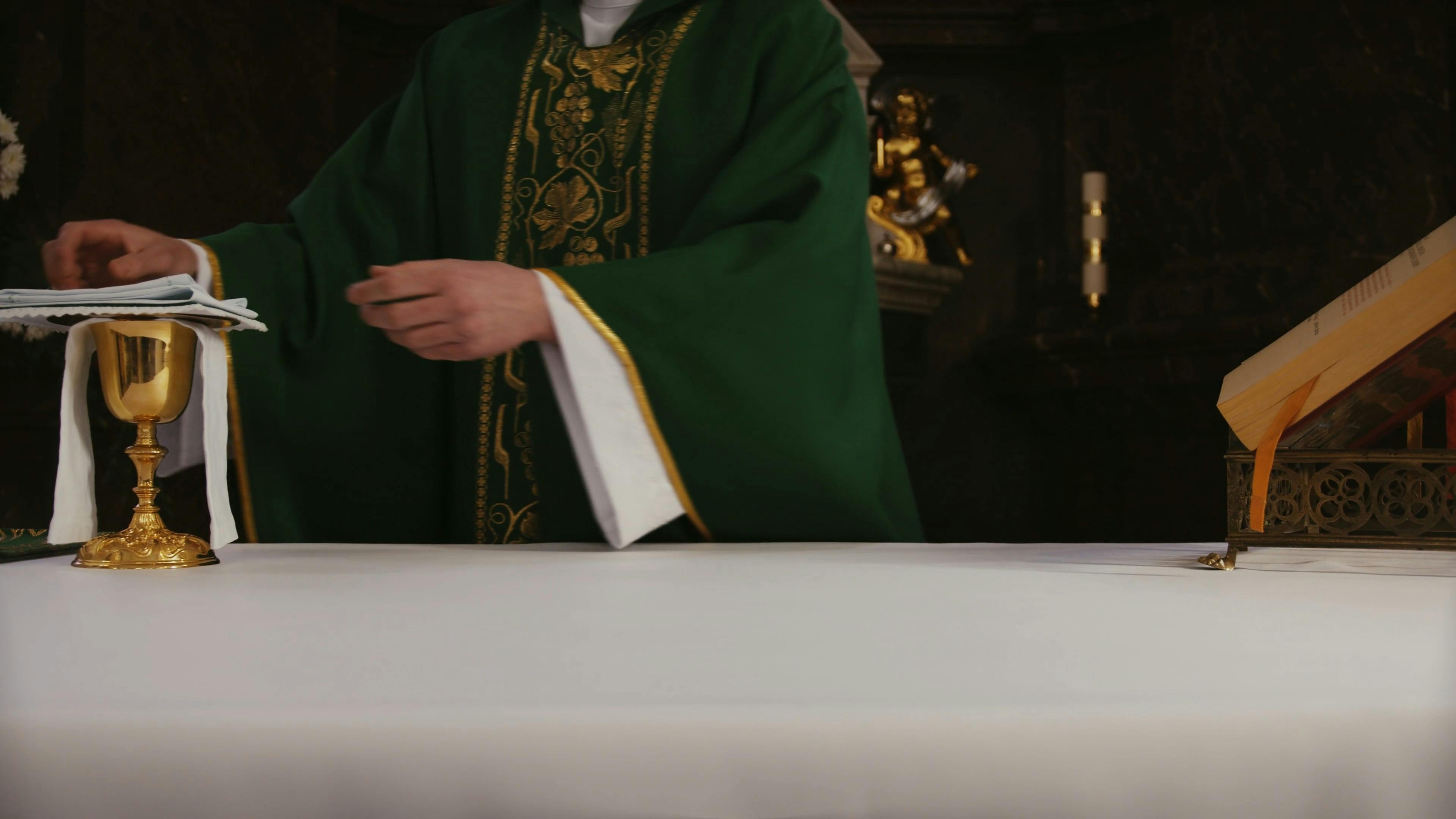 A Priest Preparing the Altar · Free Stock Video