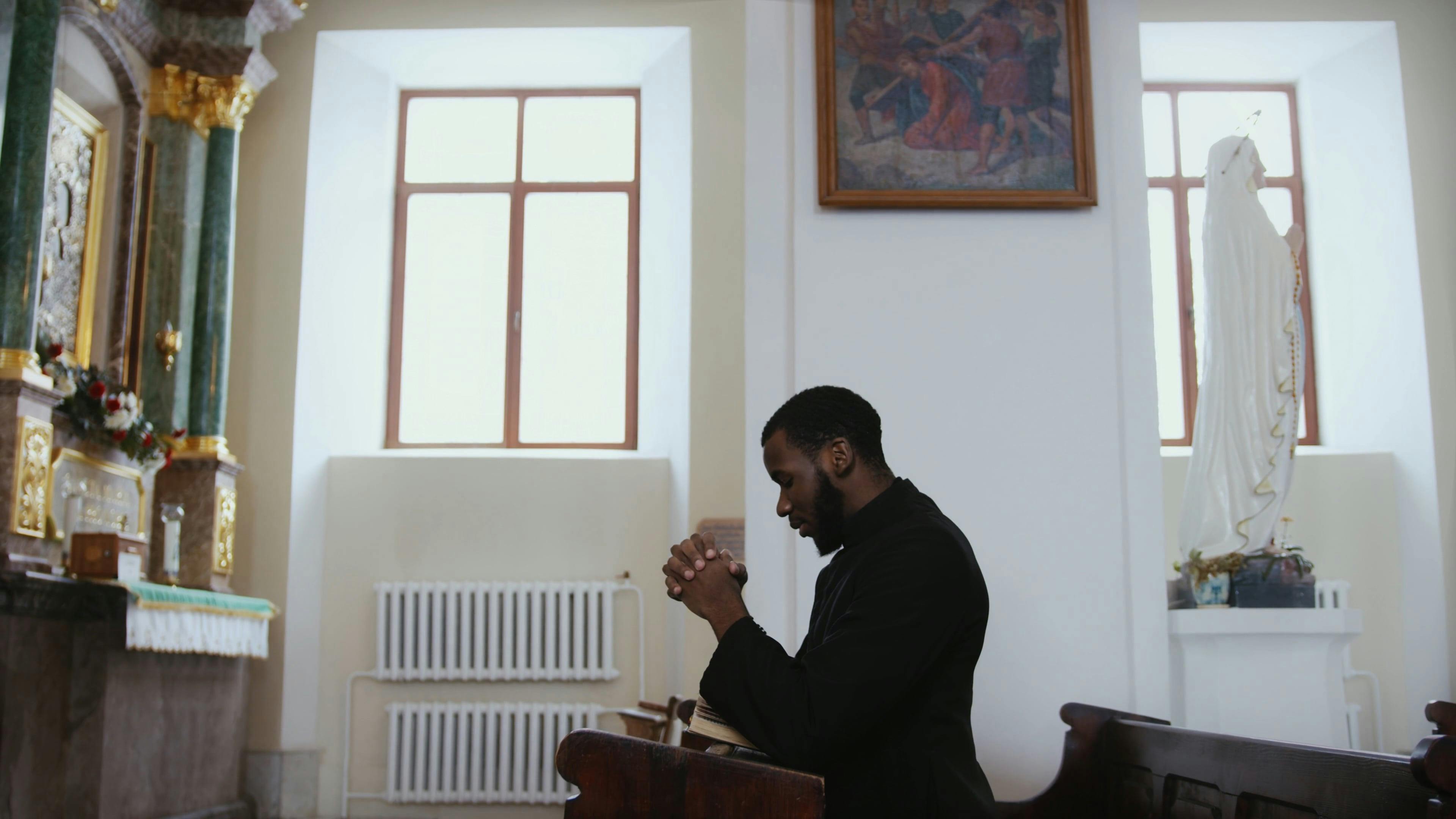 Side View Of Man Praying On Knees · Free Stock Video