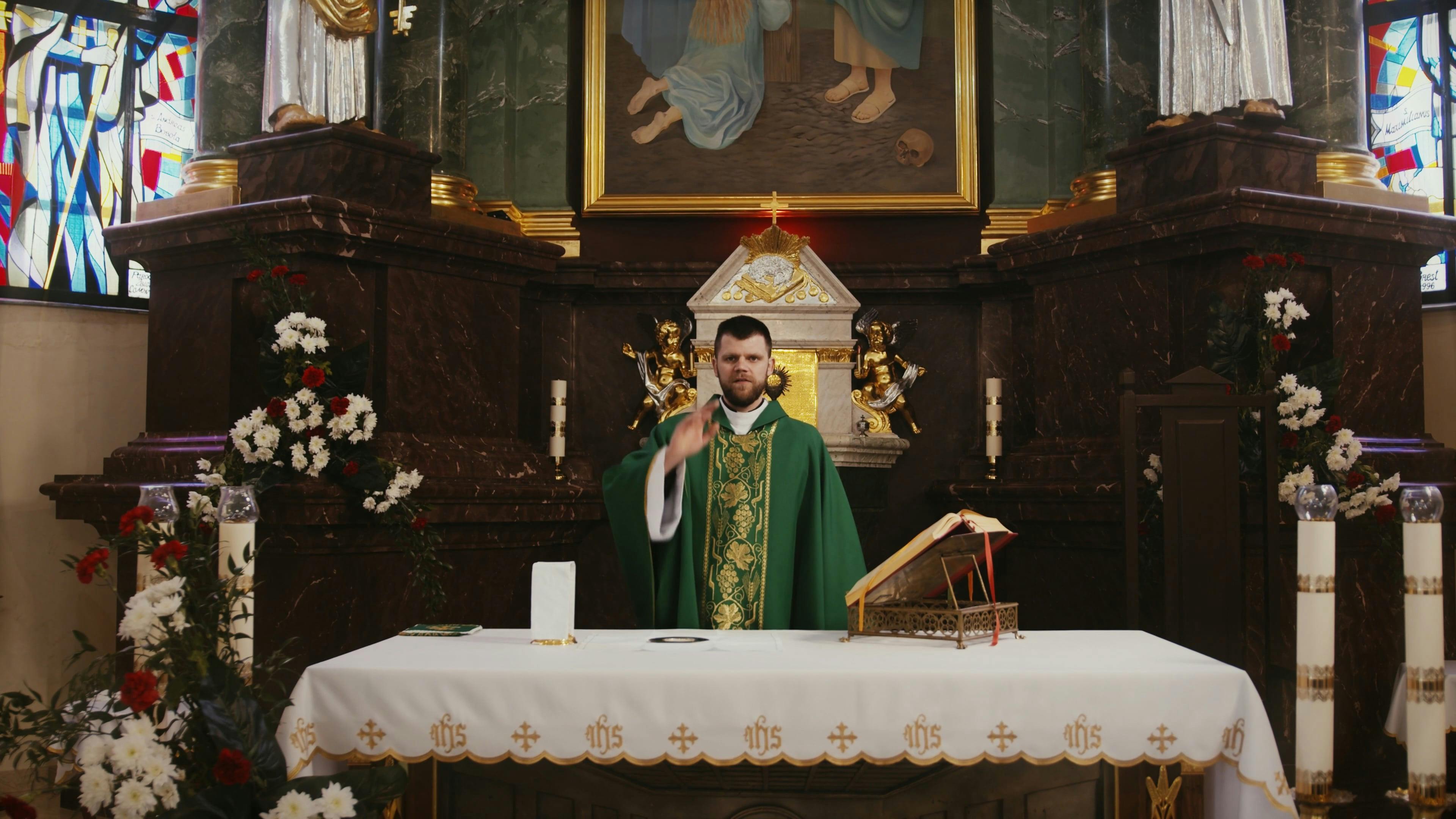 A Priest Doing the Sign of the Cross at the Altar Free Stock Video ...