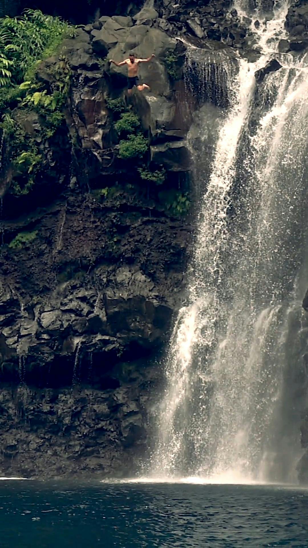 Man Jumping off Waterfalls · Free Stock Video
