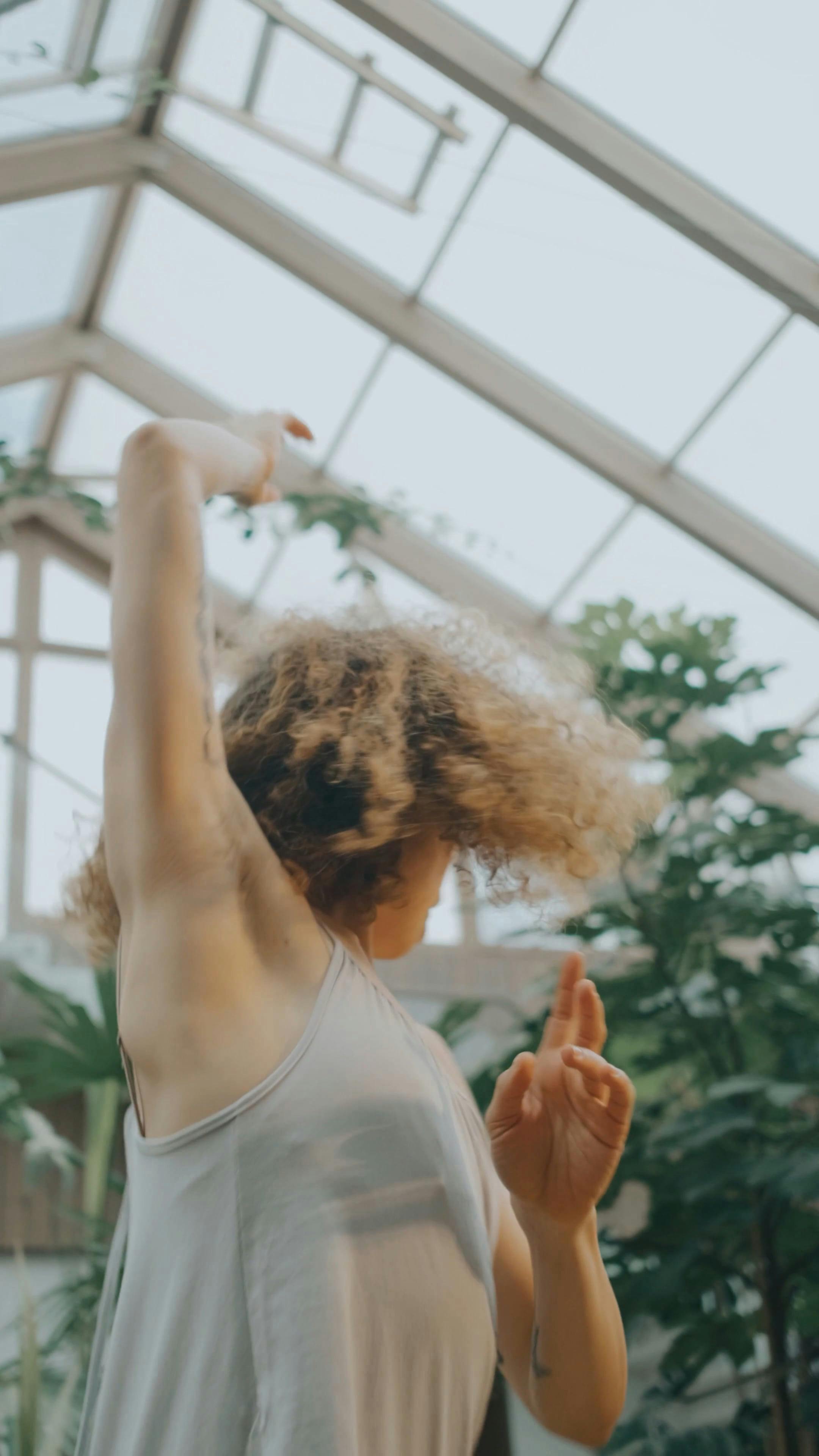 A Woman Dancing While Looking at the Camera · Free Stock Video