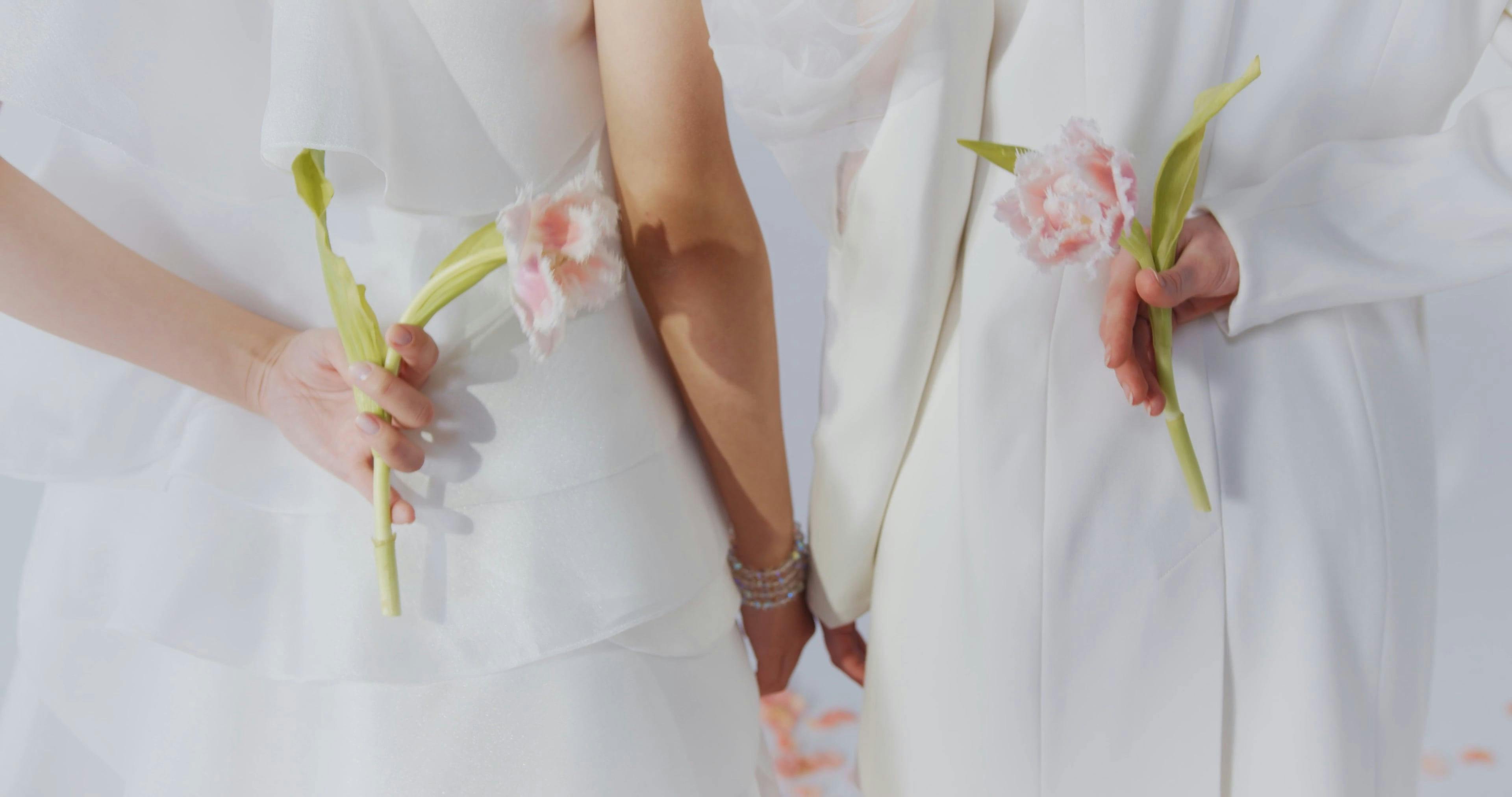 Back View of Women in Elegant Dress Holding Flowers Behind Back · Free ...