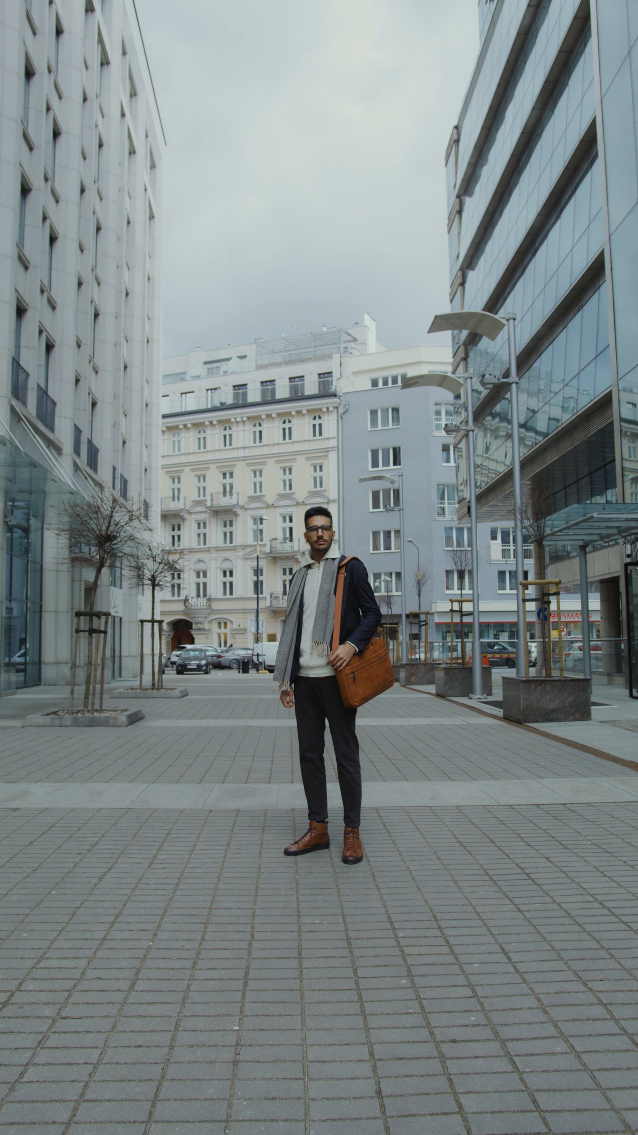 Video of a Young Man Standing on City Street · Free Stock Video