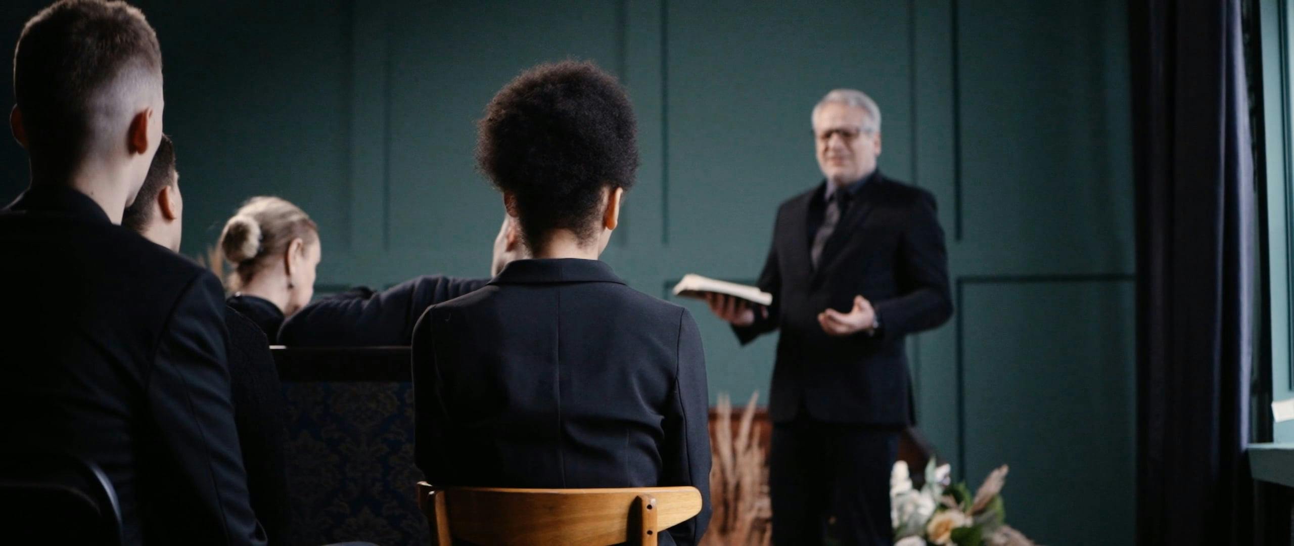 A Preacher Preaching at the Funeral · Free Stock Video