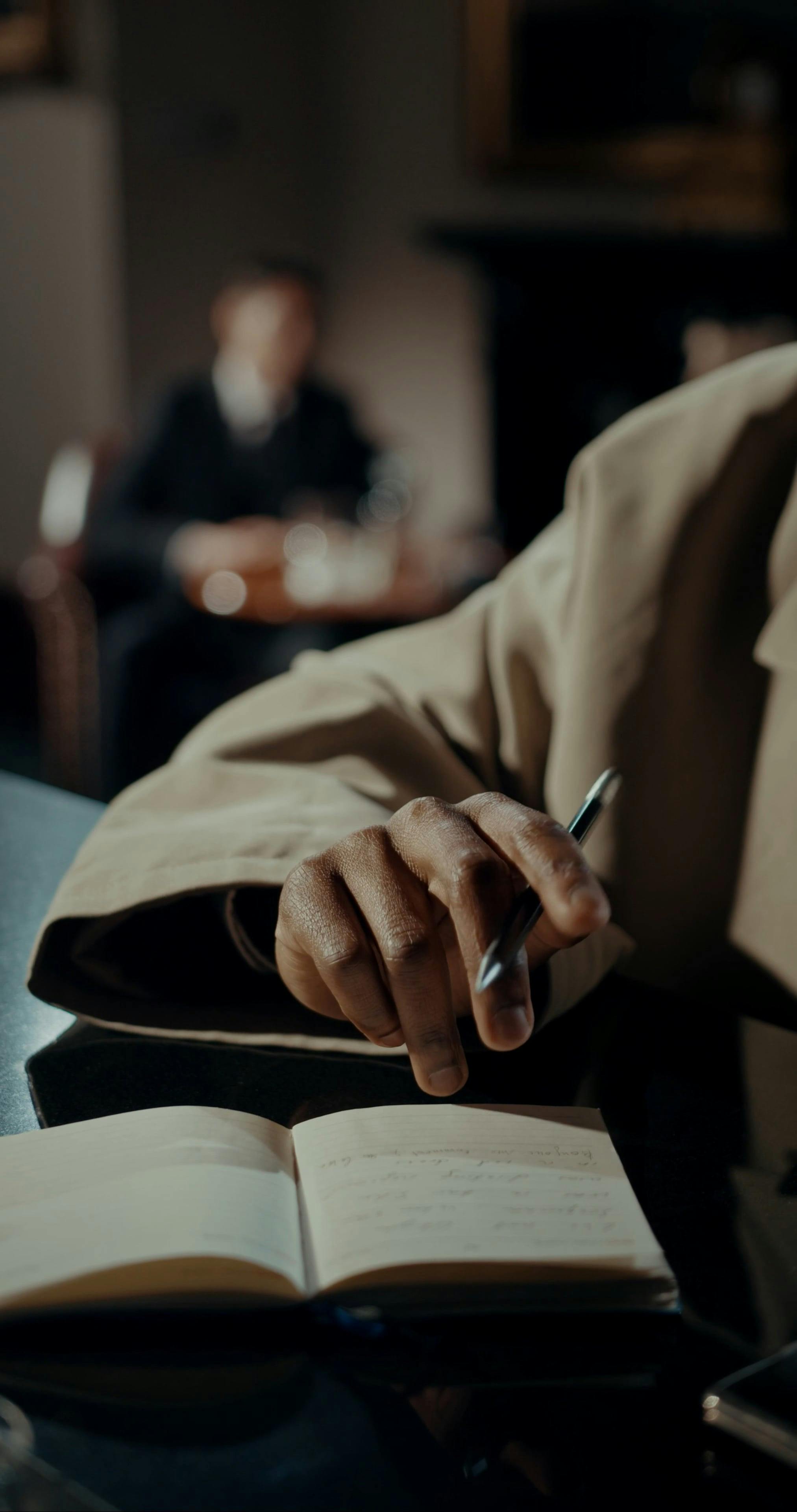 A Man Taking Notes During Surveillance Free Stock Video Footage ...