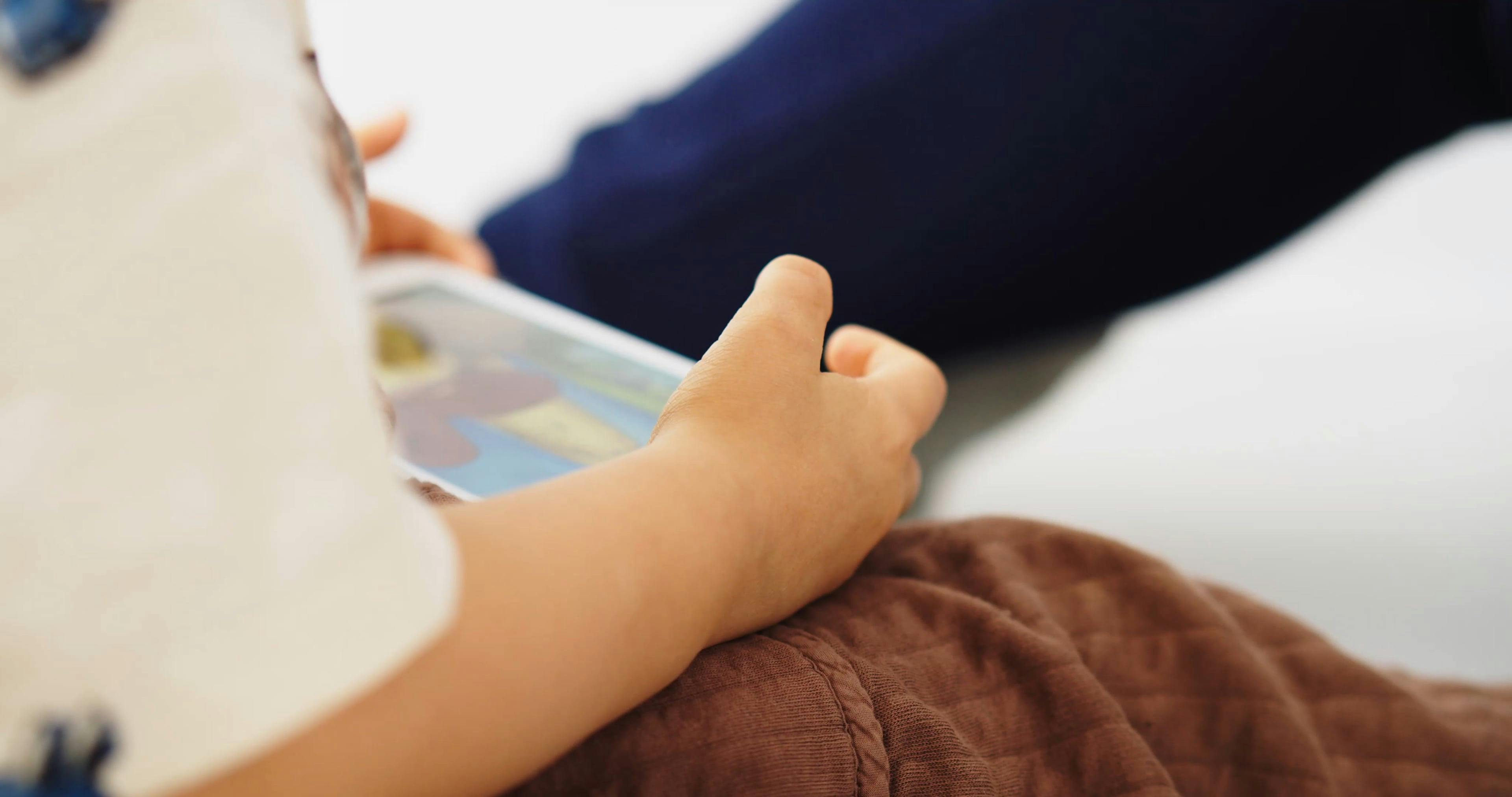 A Person Watching from the Phone · Free Stock Video