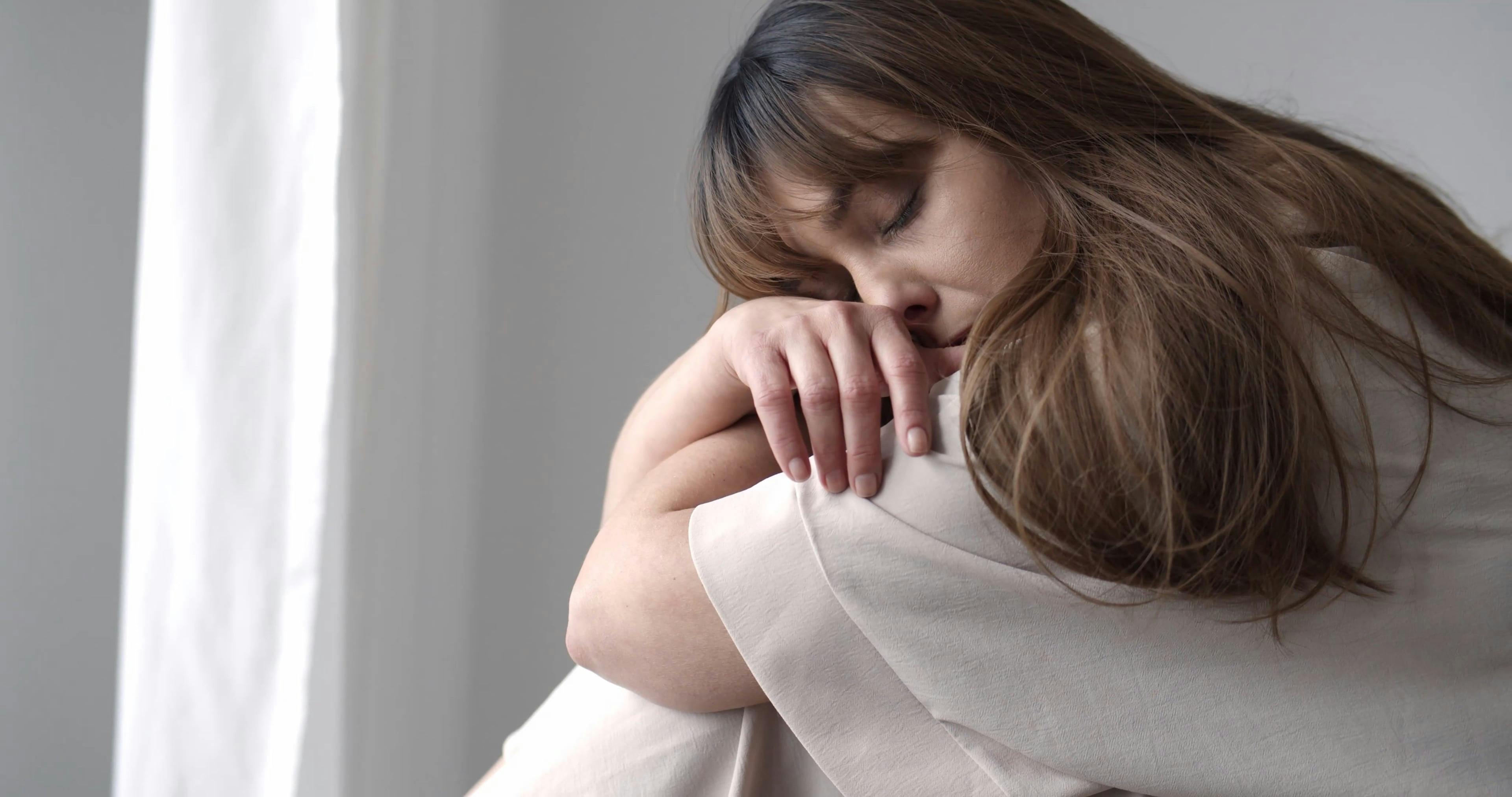 A Woman Comforting Herself · Free Stock Video