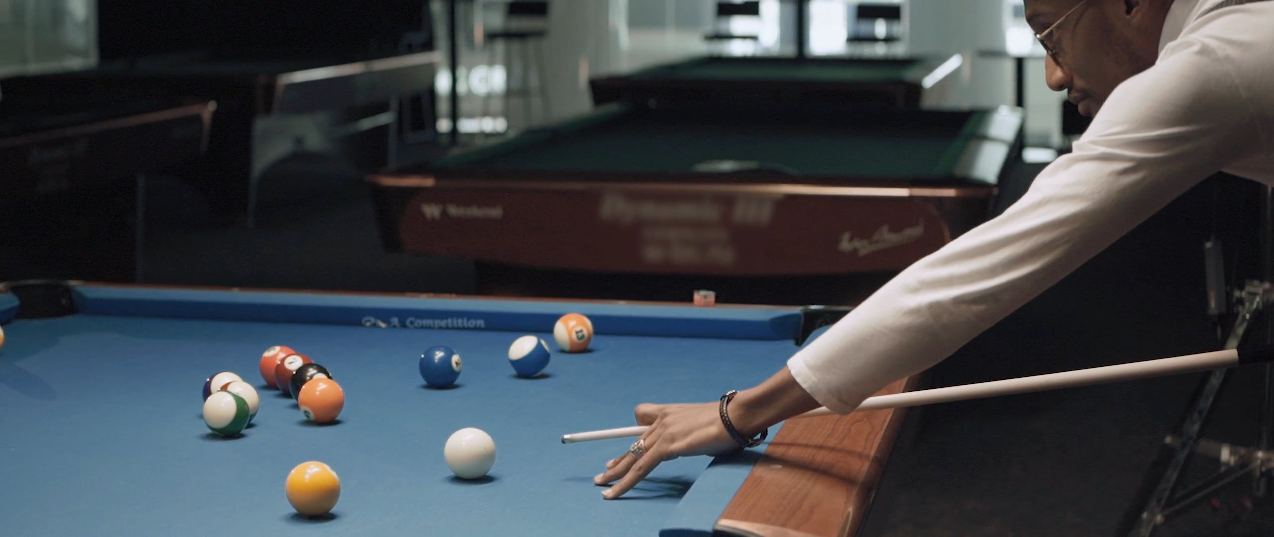 A Man Hitting a Cue Ball on a Billiard Table · Free Stock Video