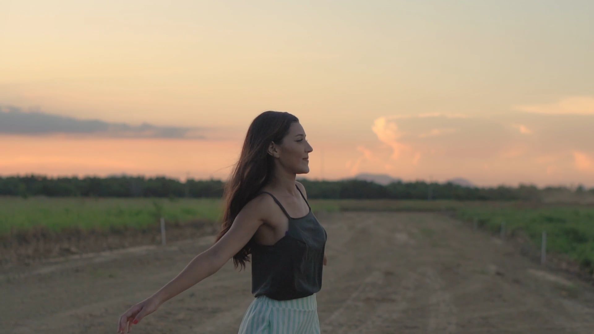 Arc Shot of a Happy Woman Spinning Around Free Stock Video Footage ...