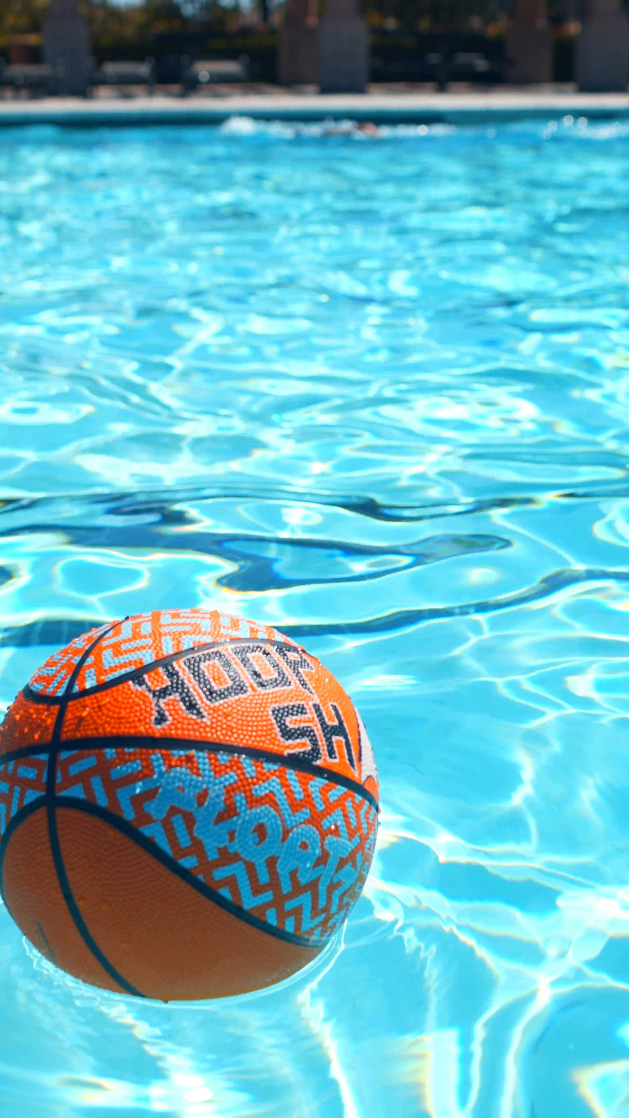 A Basketball Floating In The Swimming Pool Free Stock Video Footage ...