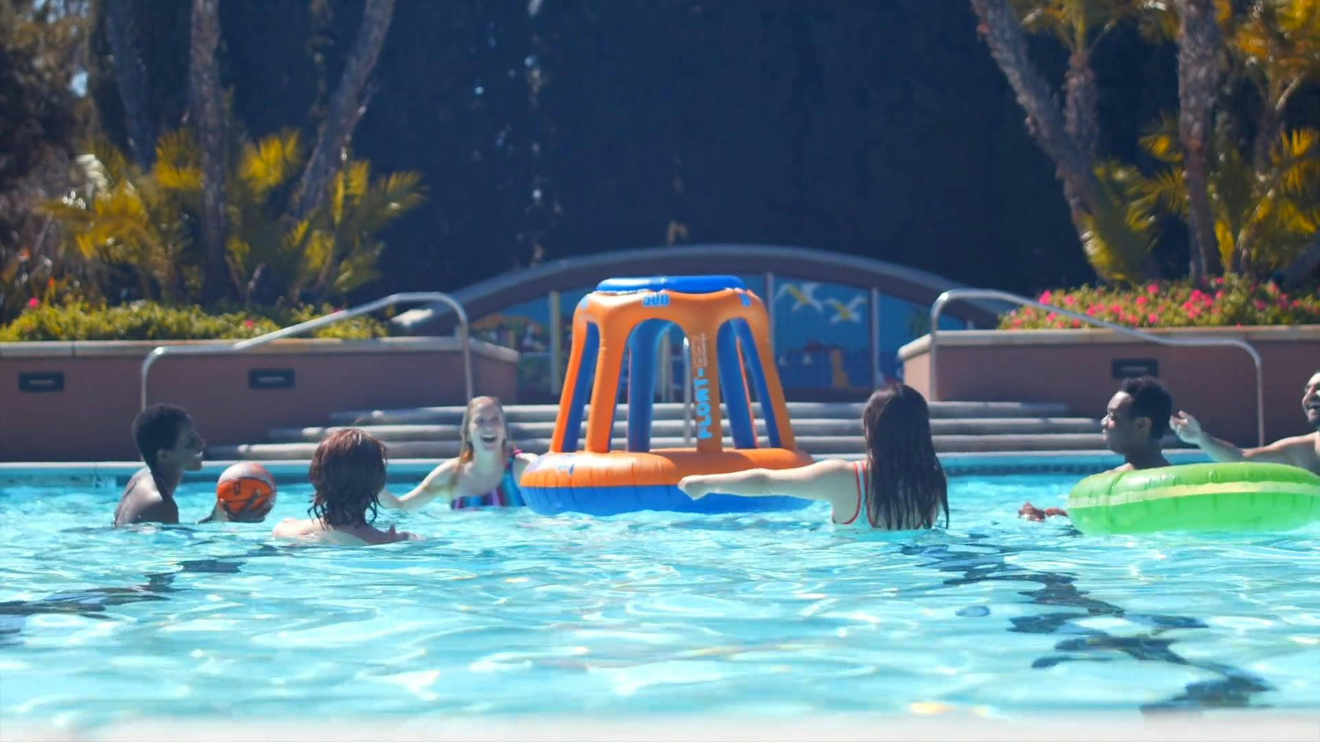 A Woman in a Swimming Pool Bouncing a Ball on the Camera Free Stock ...