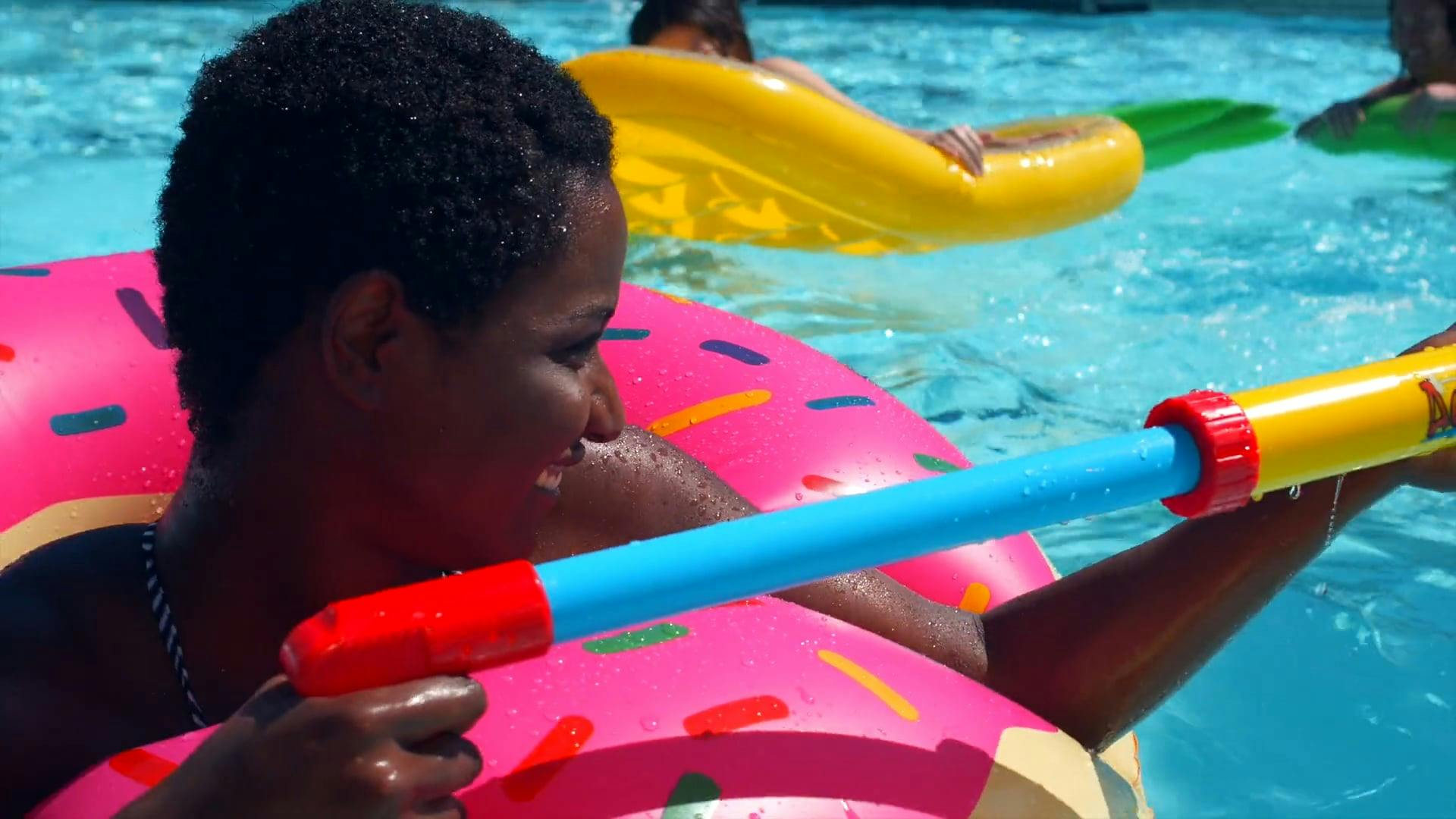 A Woman Using Having Fun With A Water Gun · Free Stock Video