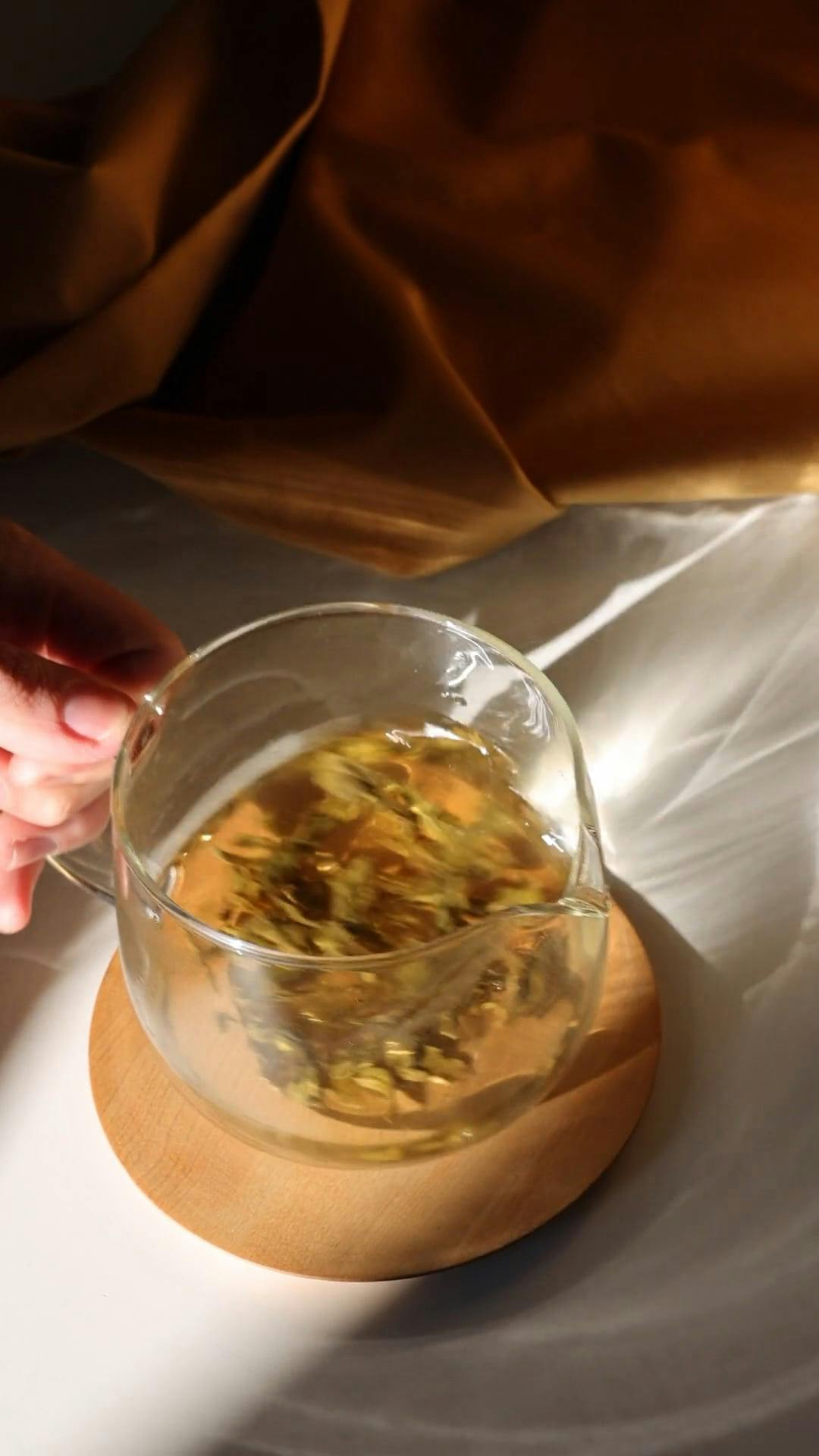 A Person Pouring Brewed Tea into a Cup Free Stock Video Footage ...