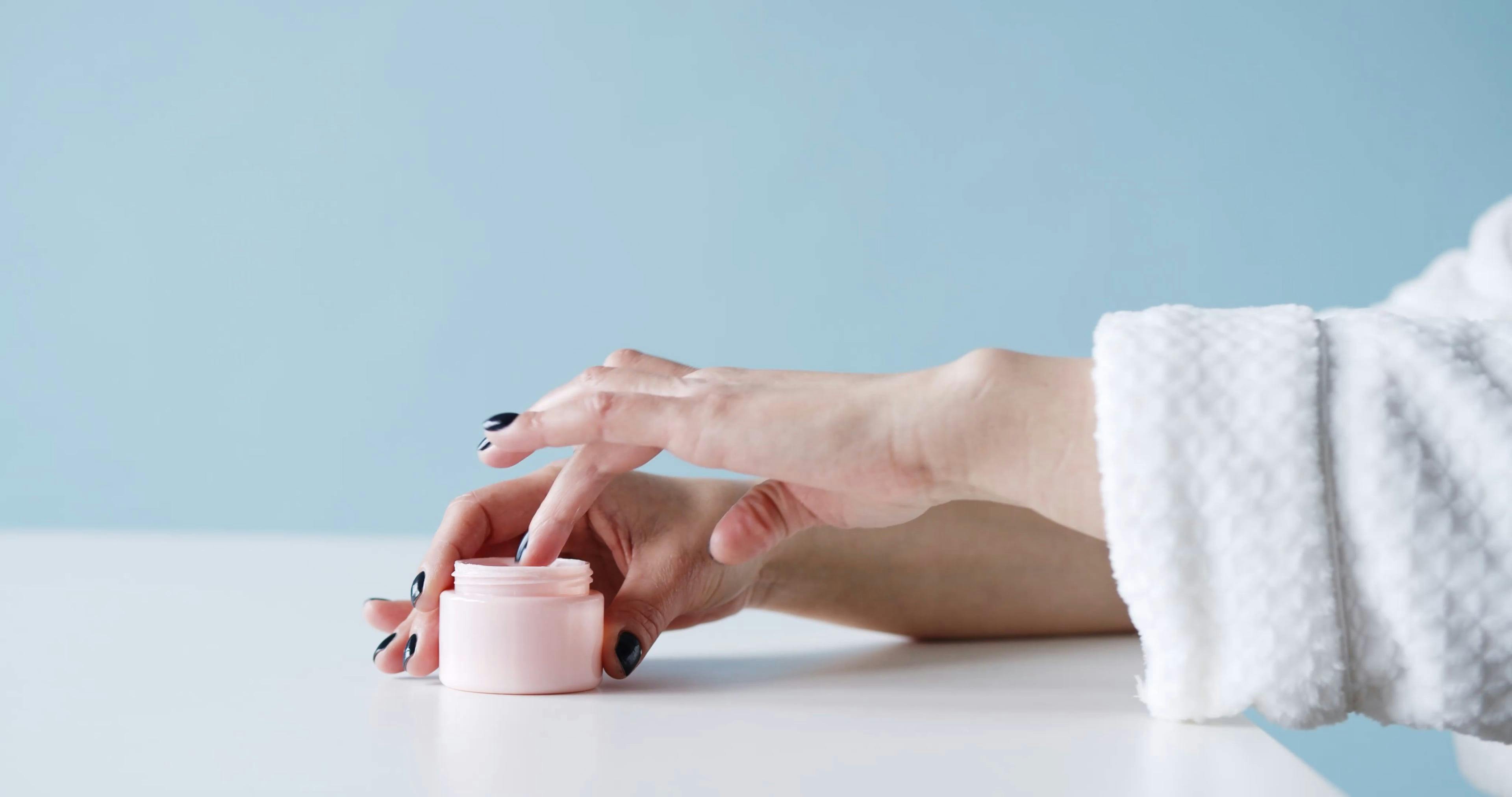 Person Applying Lotion · Free Stock Video