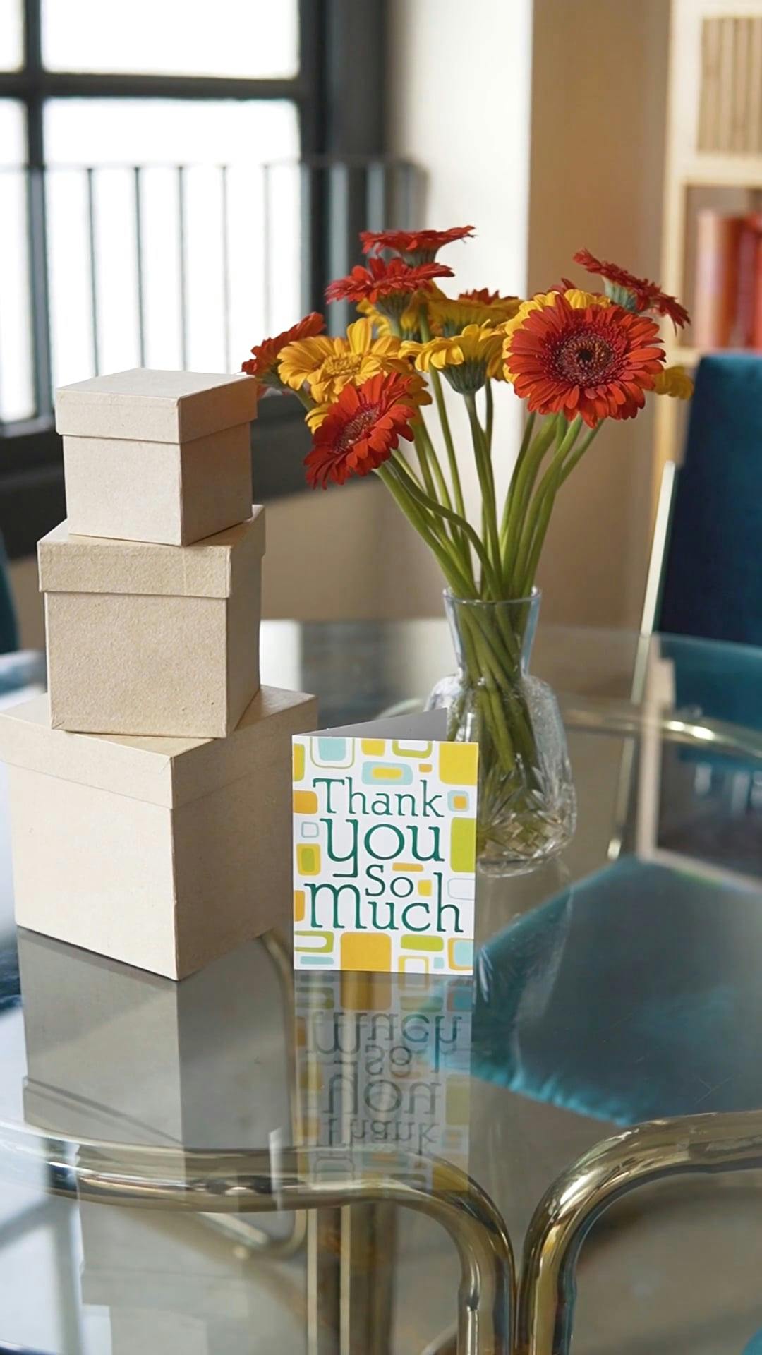 Stacked Boxes and a Thank You Card · Free Stock Video