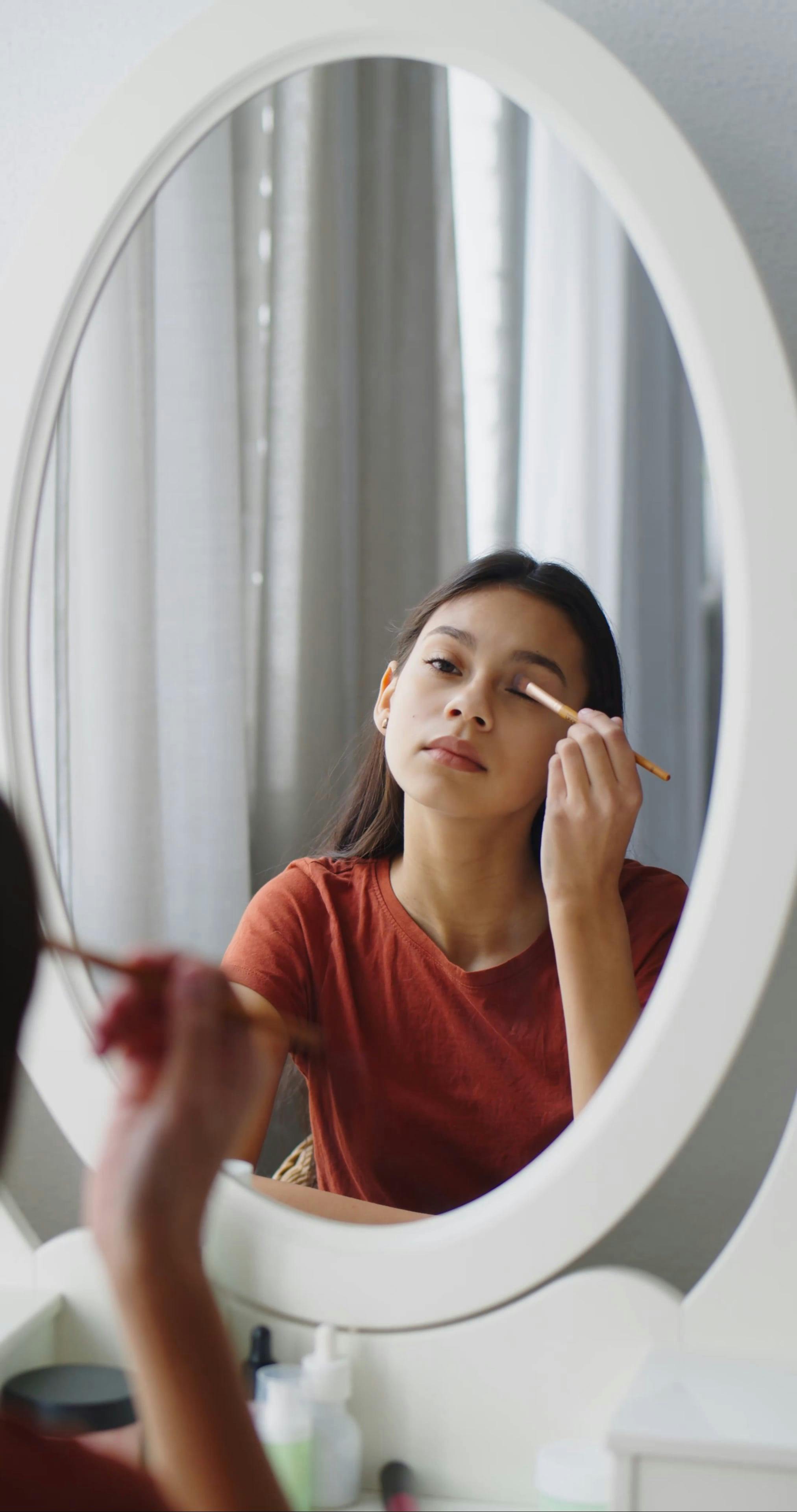 A Woman Doing Her Makeup Free Stock Video Footage, Royalty-Free 4K & HD ...