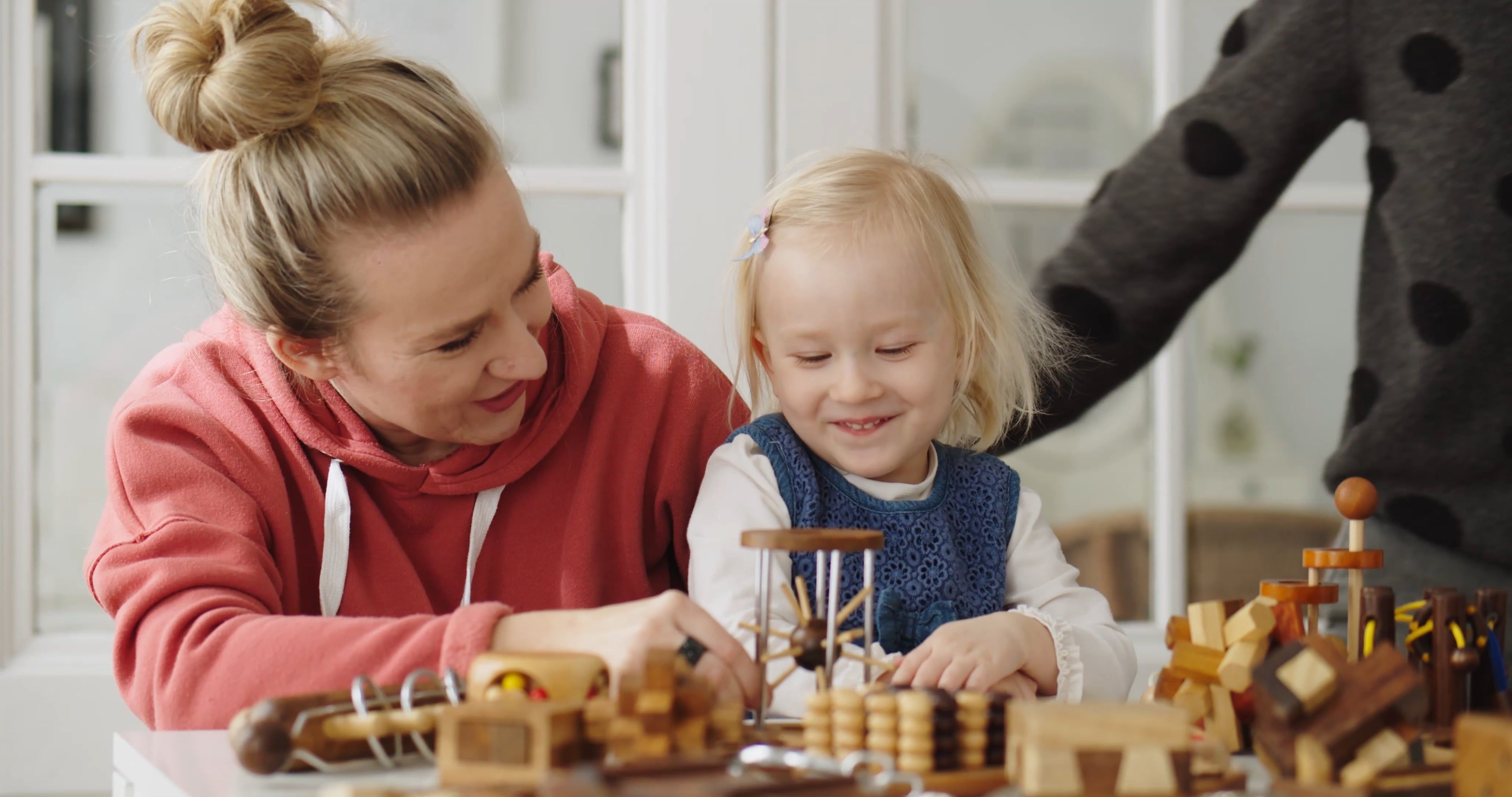 Parents Playing with their Child using Wooden Toys Free Stock Video ...