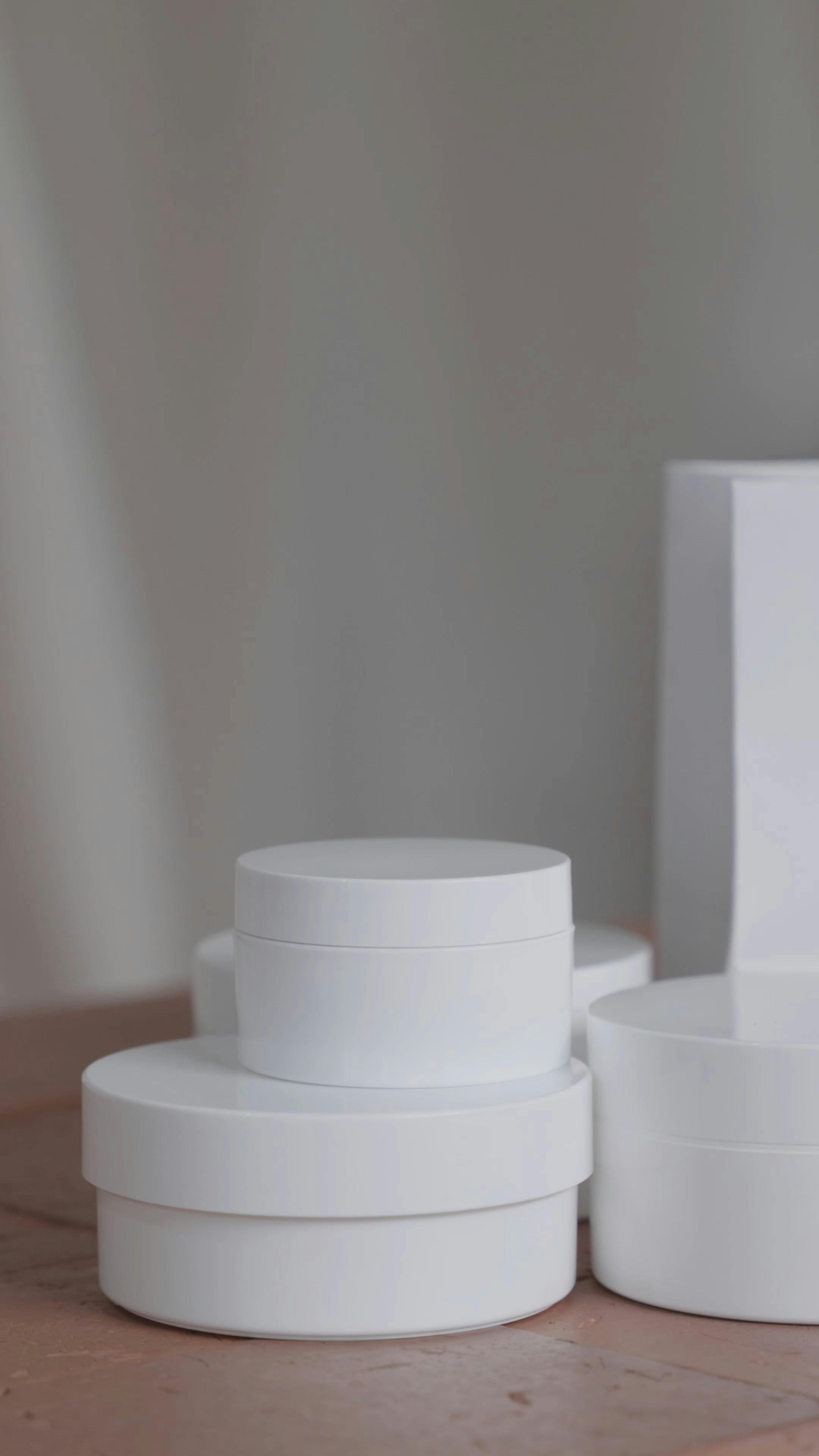 Stacked White Cosmetic Containers · Free Stock Video