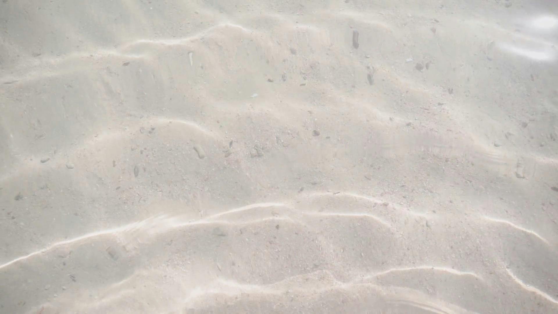 Slow Motion Footage Of Undulating Water Surface Reflecting The Light ...