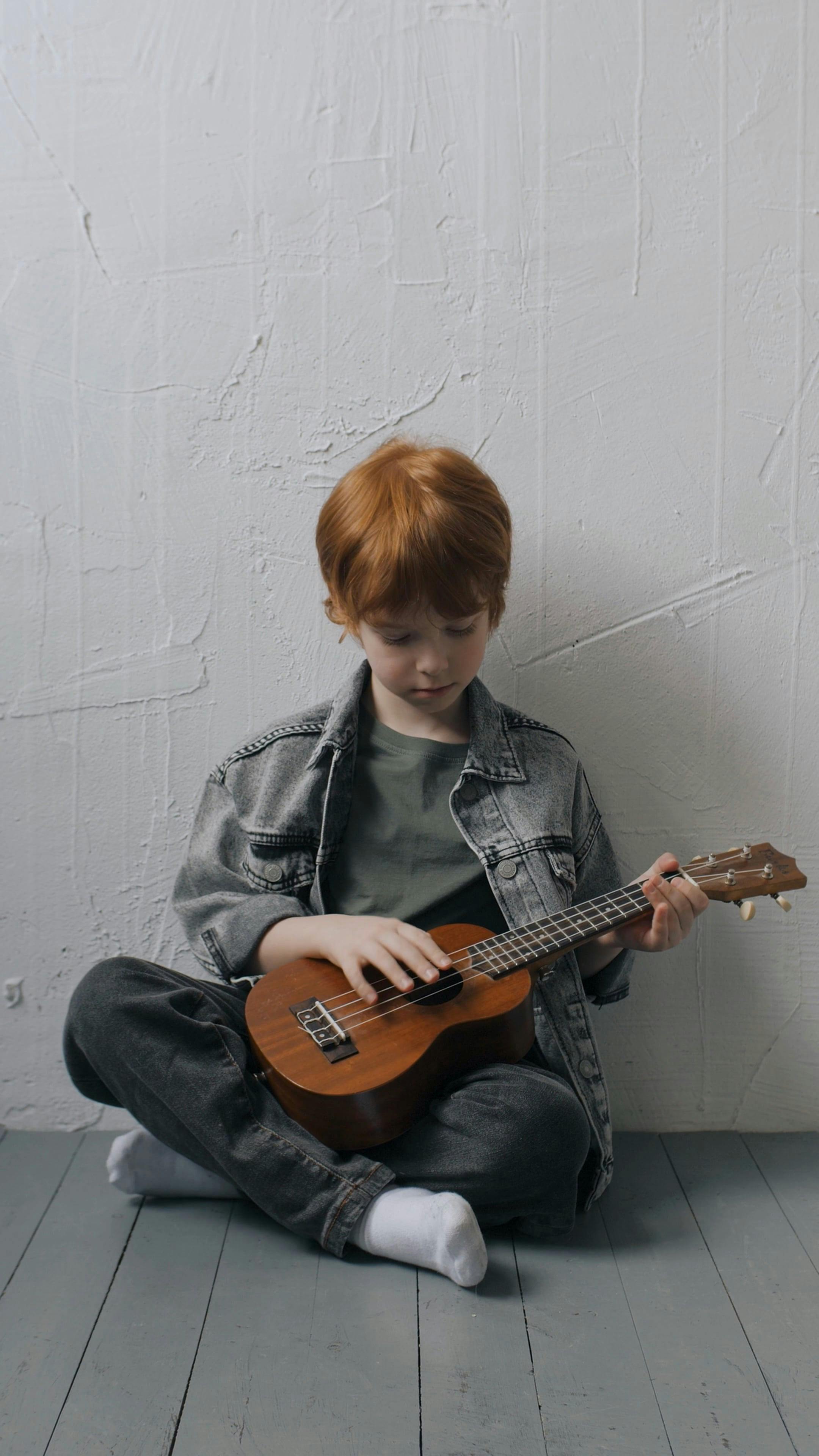 Boy Playing Ukulele Free Stock Video Footage, Royalty-Free 4K & HD ...