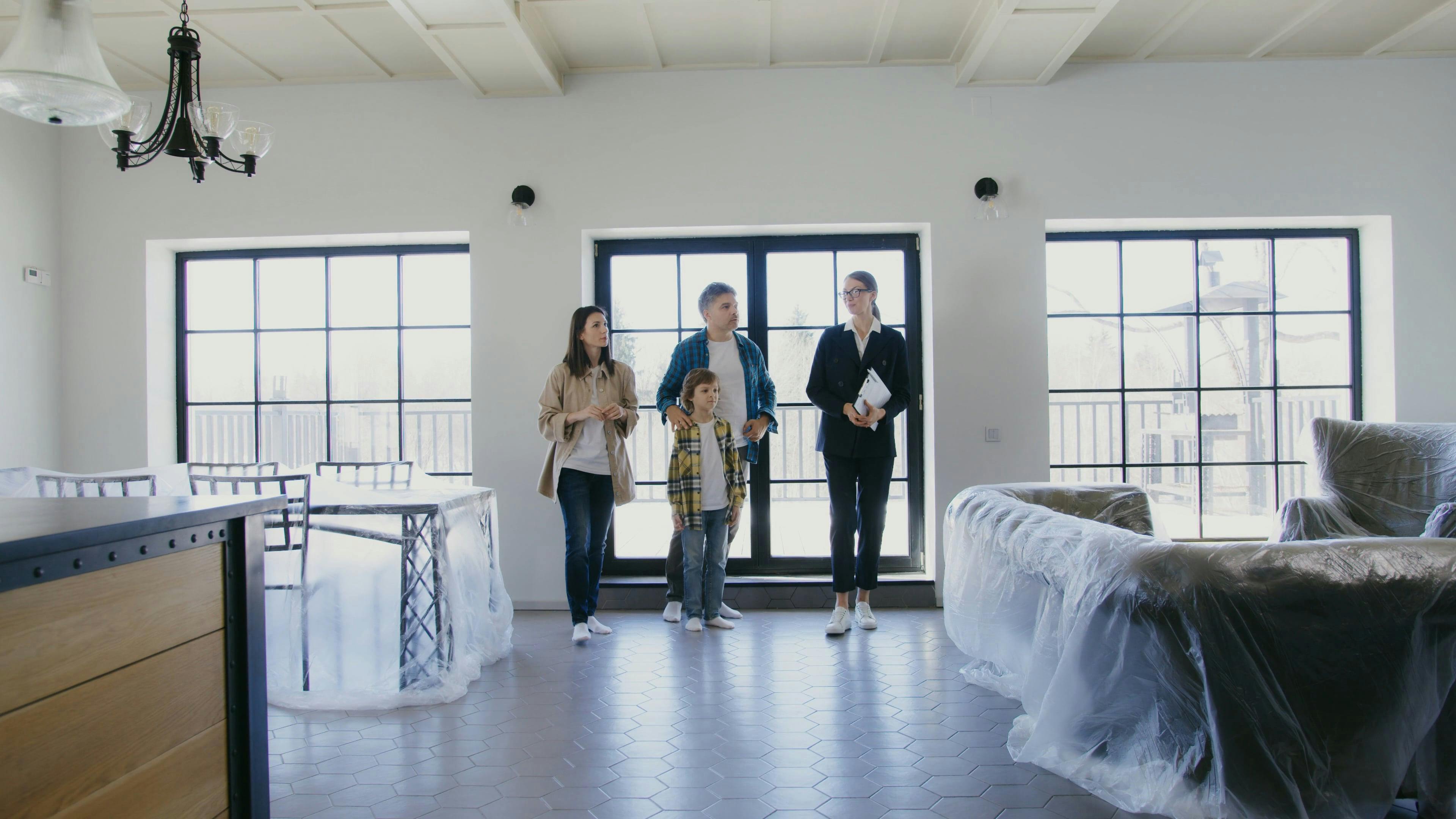 Real Estate Agent and Family Visiting a House Free Stock Video Footage ...