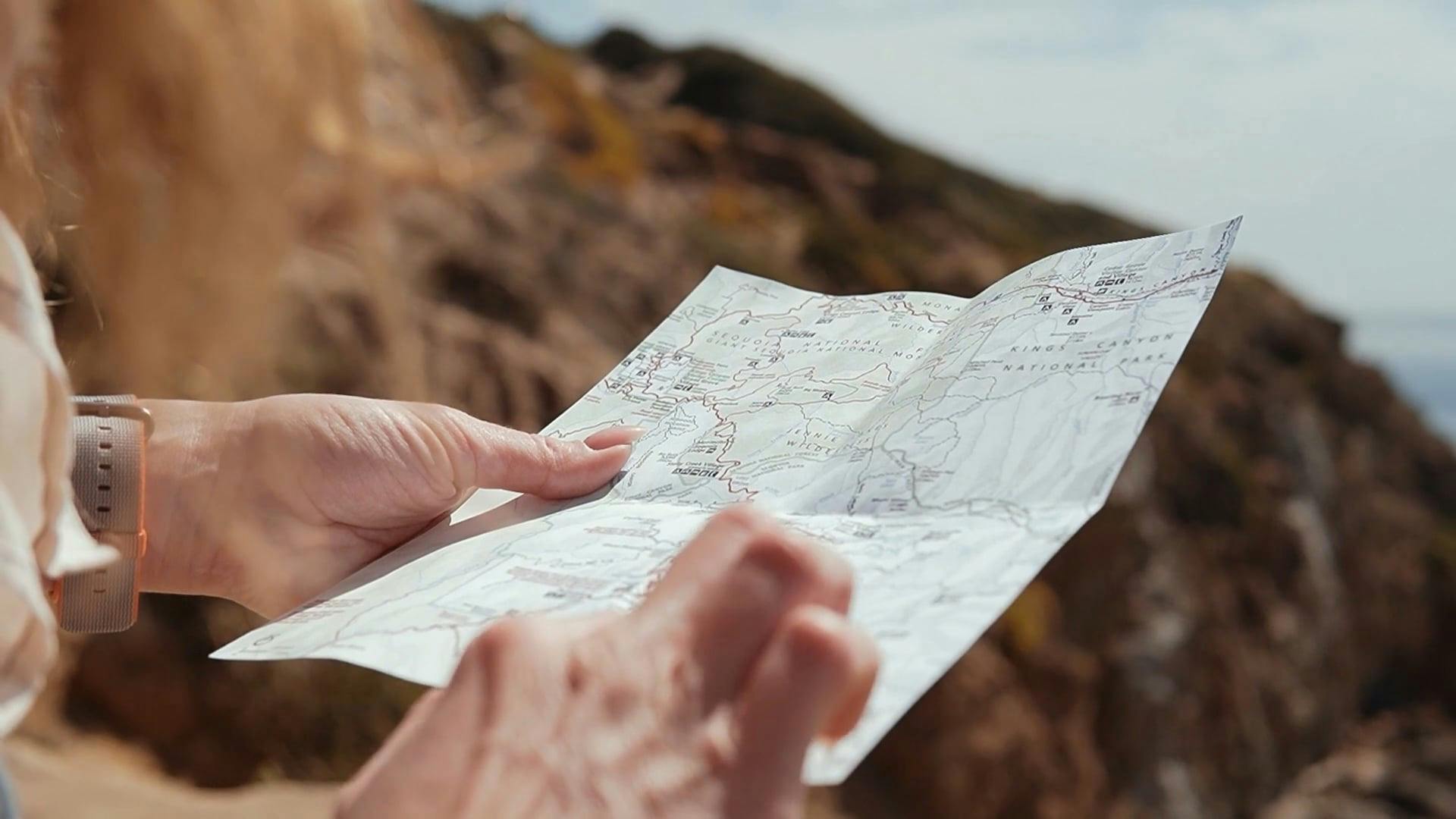 Person Holding A Map Free Stock Video Footage, Royalty-Free 4K & HD ...