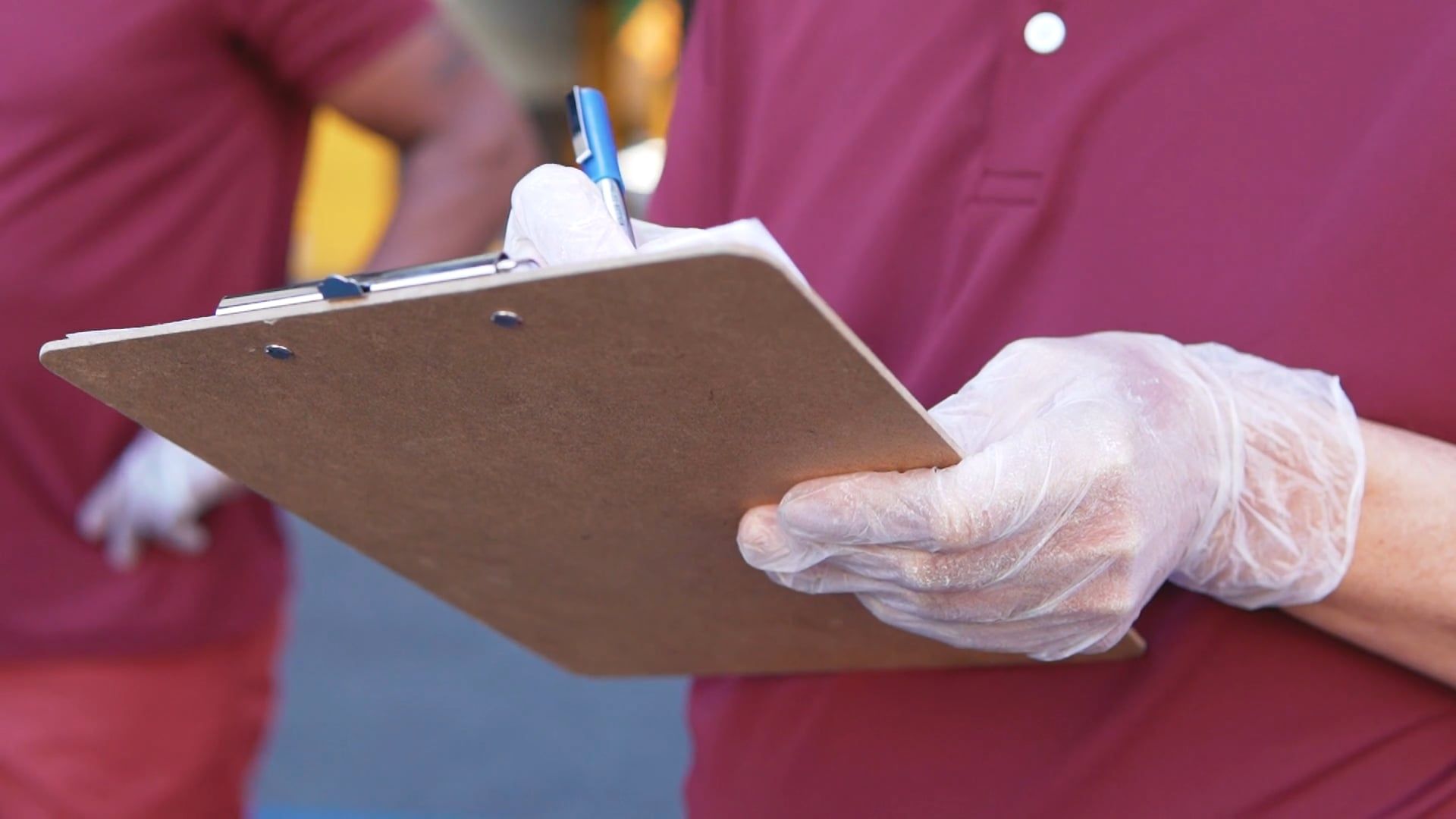 A Person Writing on his Paper · Free Stock Video