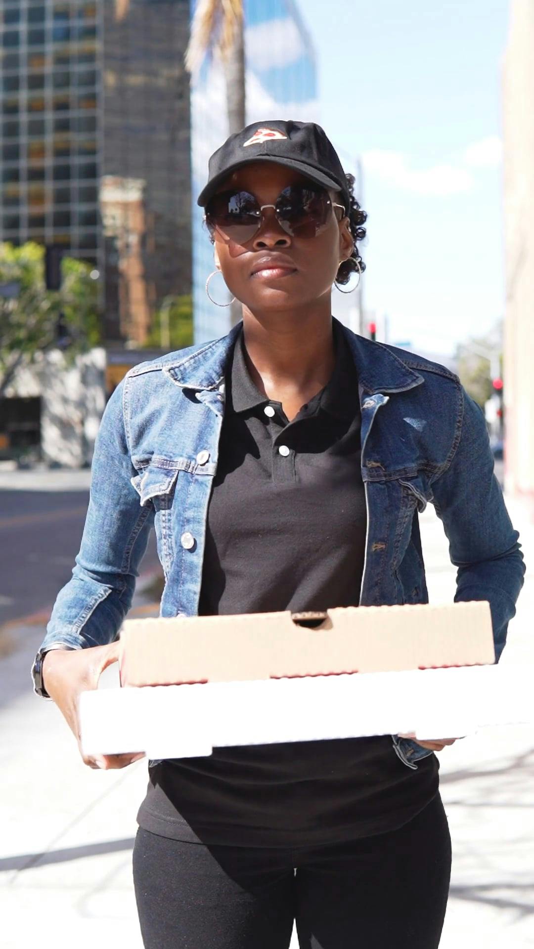 A Delivery Woman Holding Boxes of Pizza · Free Stock Video