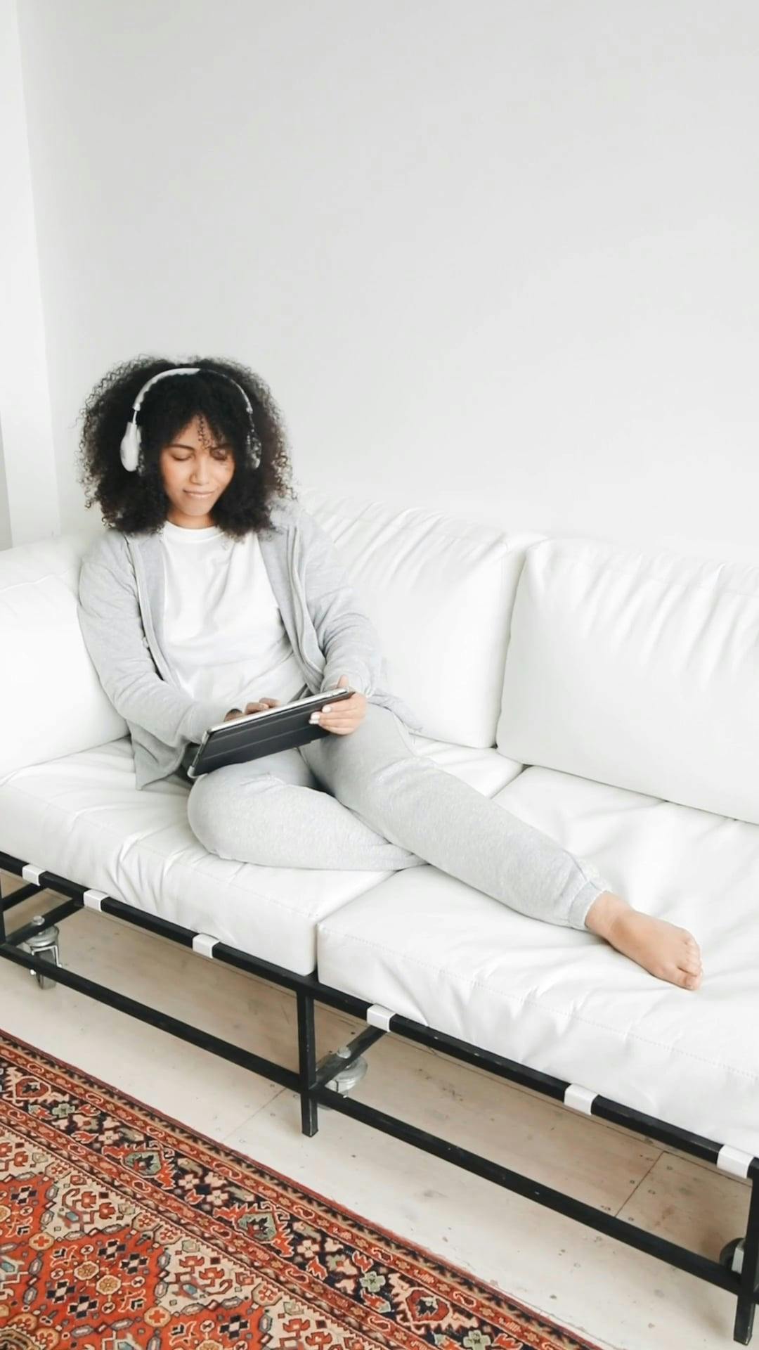 Woman with Curly Hair Using a Tablet Free Stock Video Footage, Royalty ...