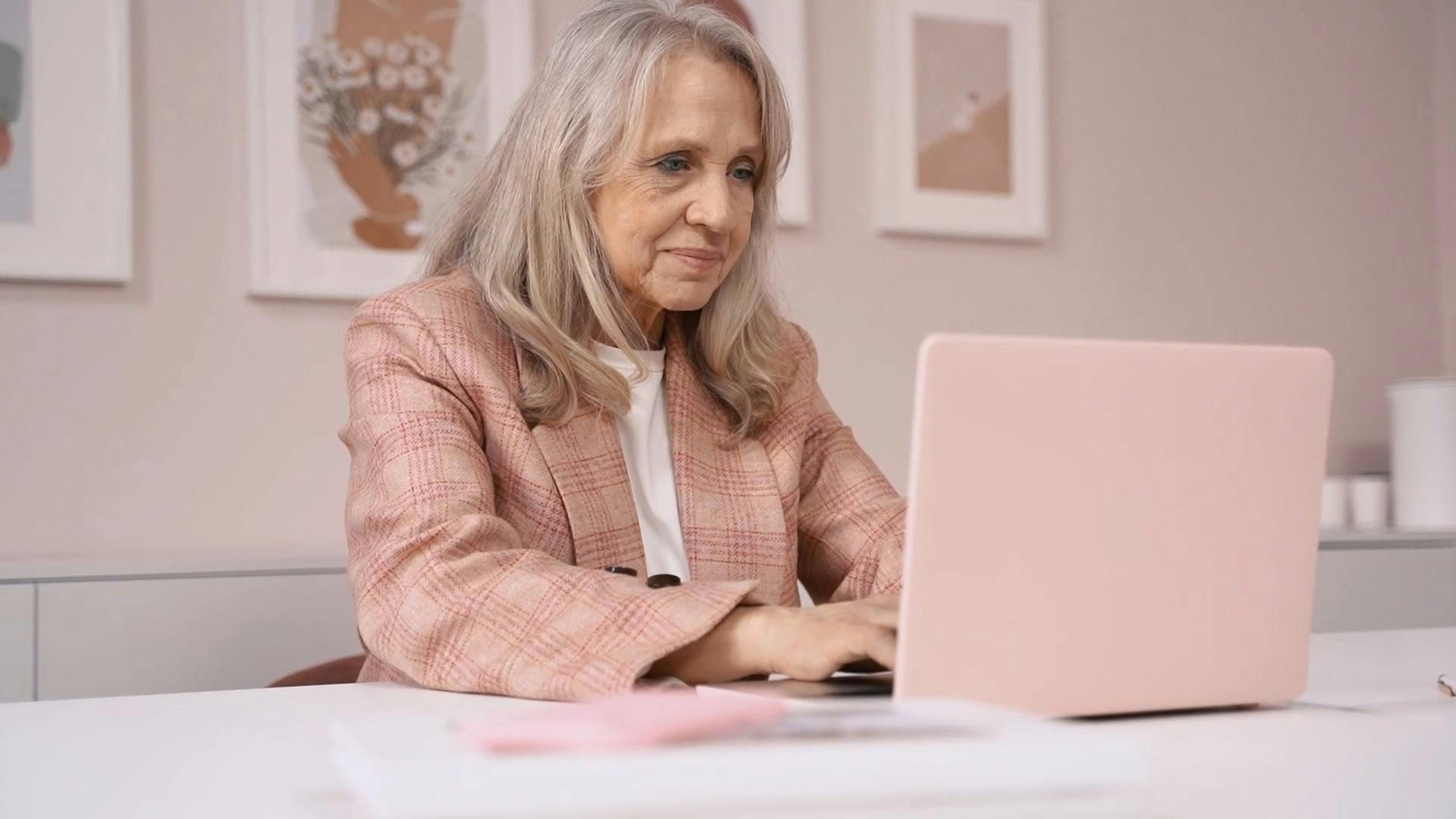 Elderly Woman using Laptop · Free Stock Video