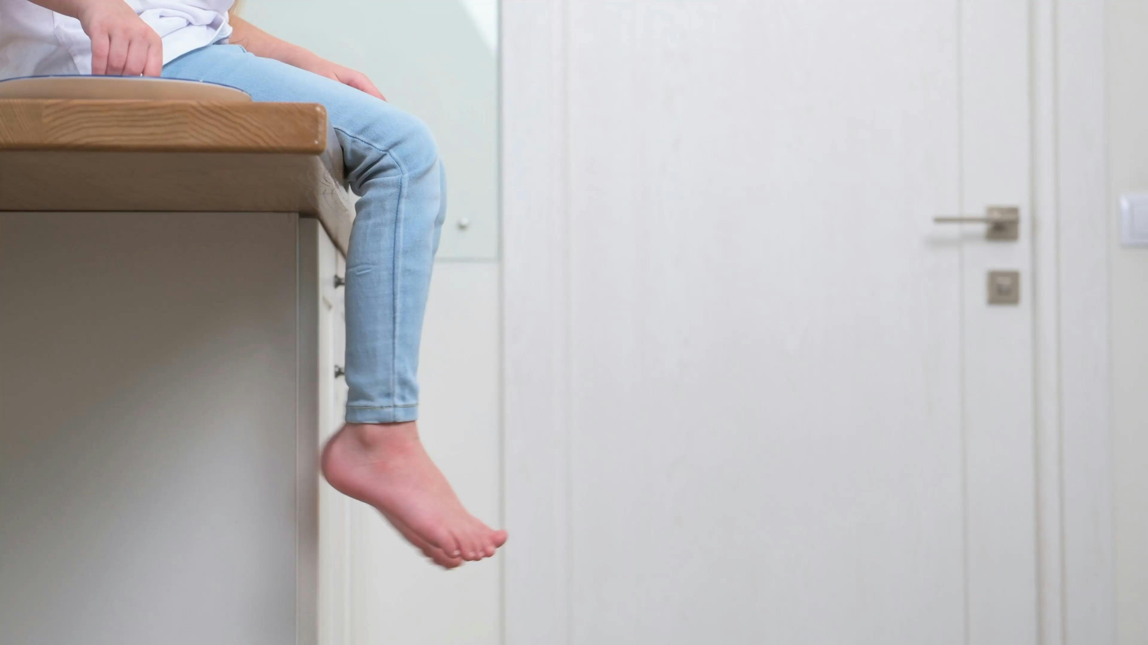 A Child Sitting on the Kitchen Counter Free Stock Video Footage ...