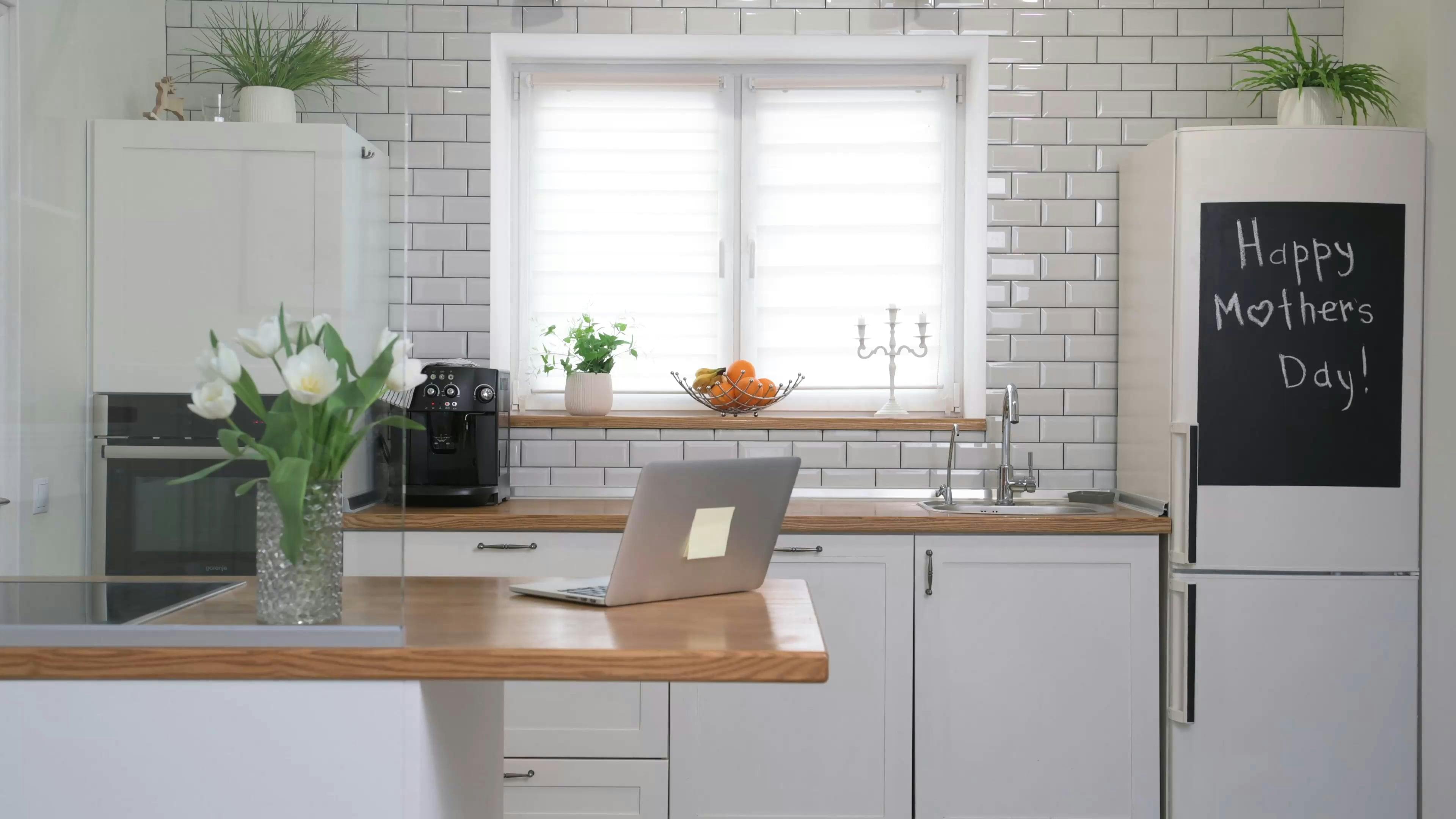 A Laptop on Top of a Kitchen Counter · Free Stock Video