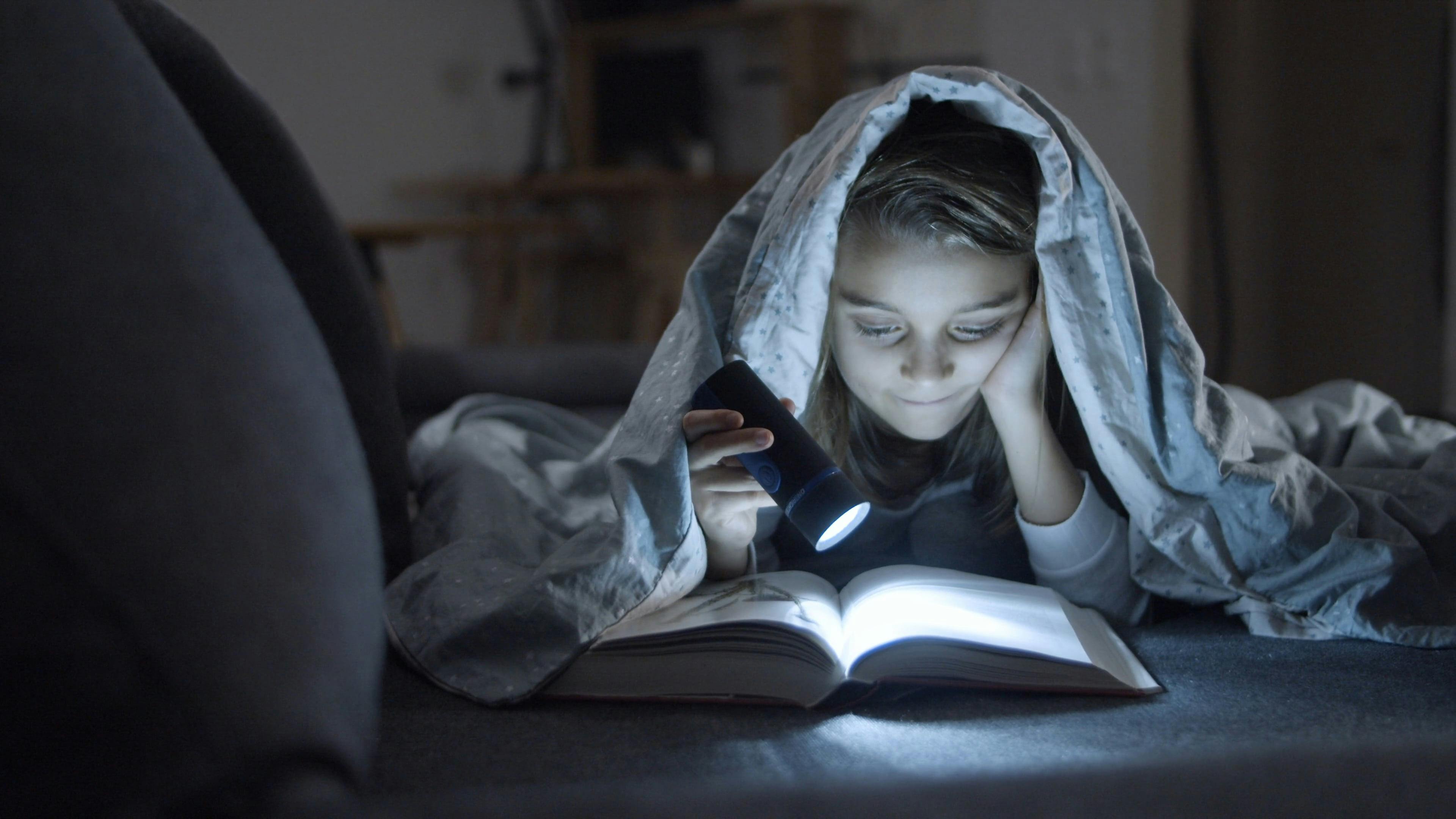 Girl Reading a Book In The Dark Free Stock Video Footage, Royalty-Free ...