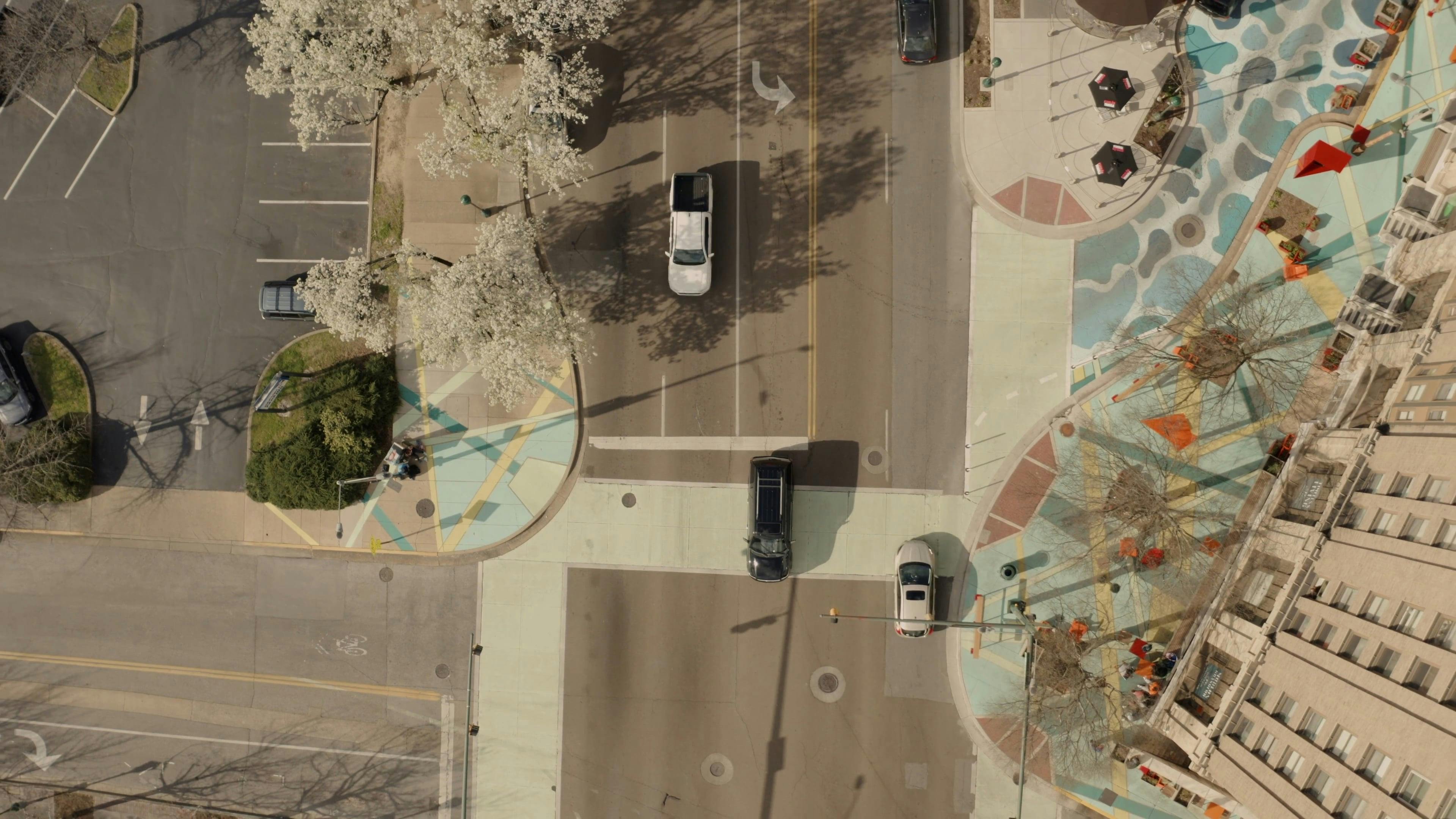 Top View of Vehicles Driving on the Intersection · Free Stock Video