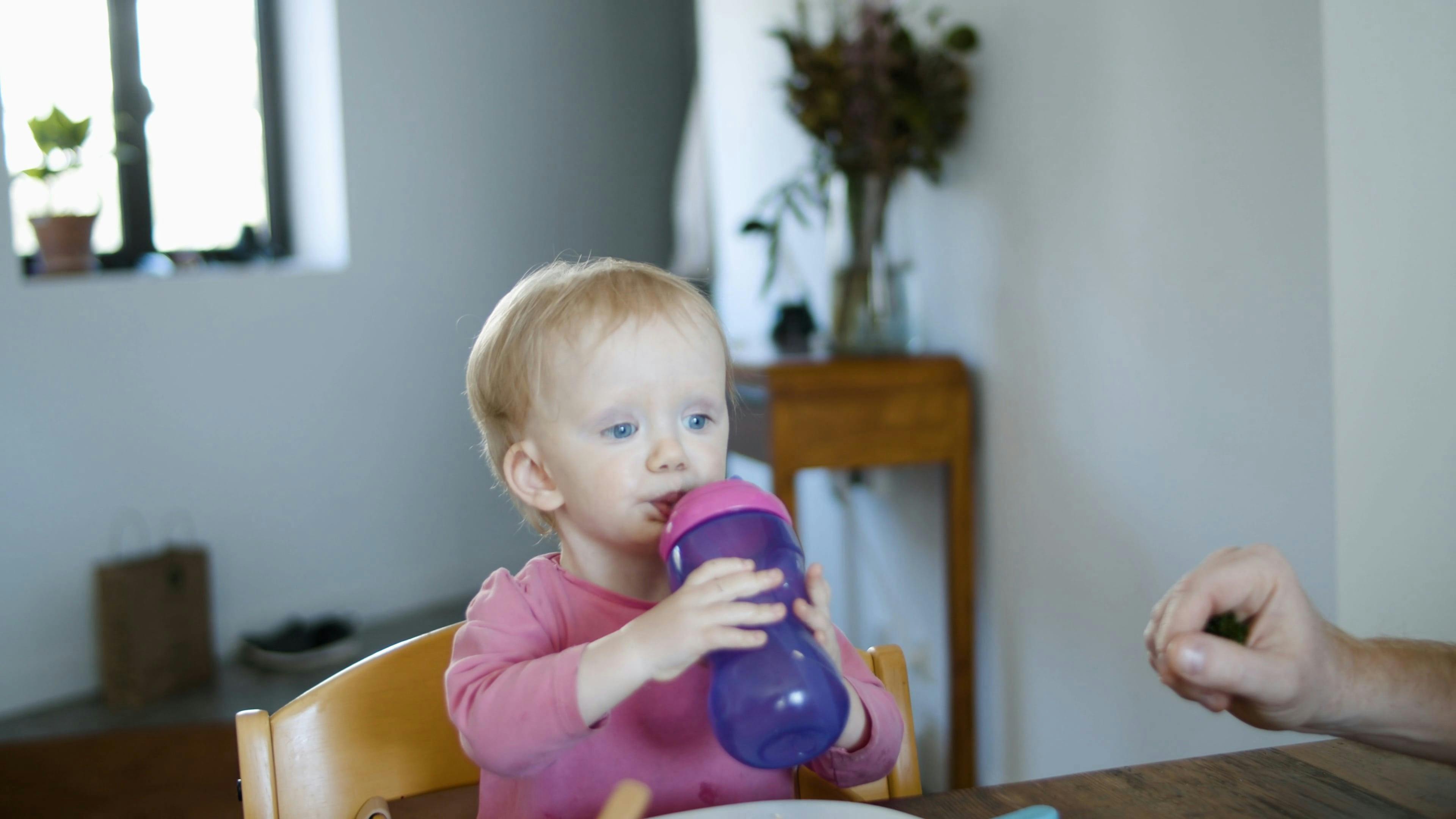 A Baby Drinking and Eating Free Stock Video Footage, Royalty-Free 4K ...